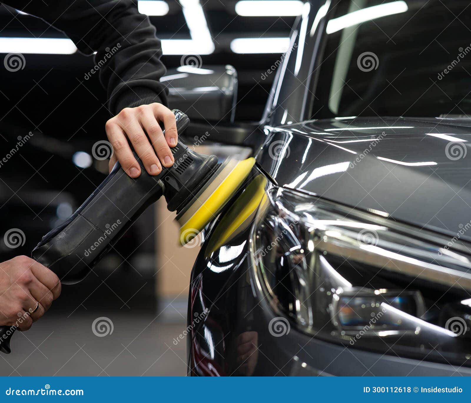 A Master Polishes the Surface of a Car Body. Stock Photo - Image of ...