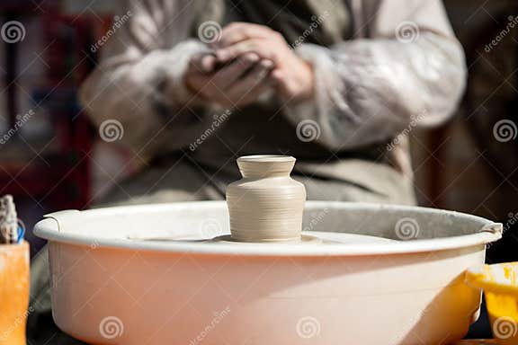 Master Potter Makes a Clay Pot on a Potter S Wheel Made of Clay Stock ...