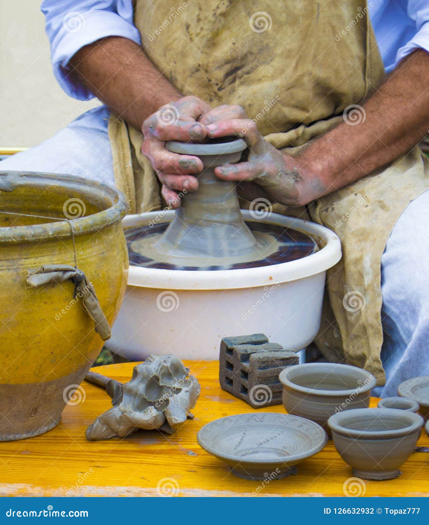 Master Potter Working at the Potter`s Wheel Stock Photo - Image of ...