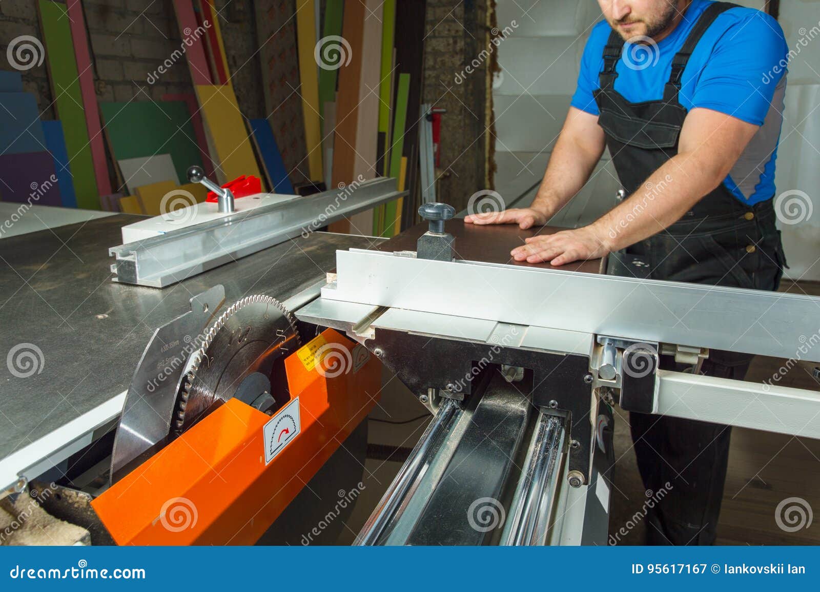 The Master Prepares the Workpiece for Cutting on a Circular Machine ...