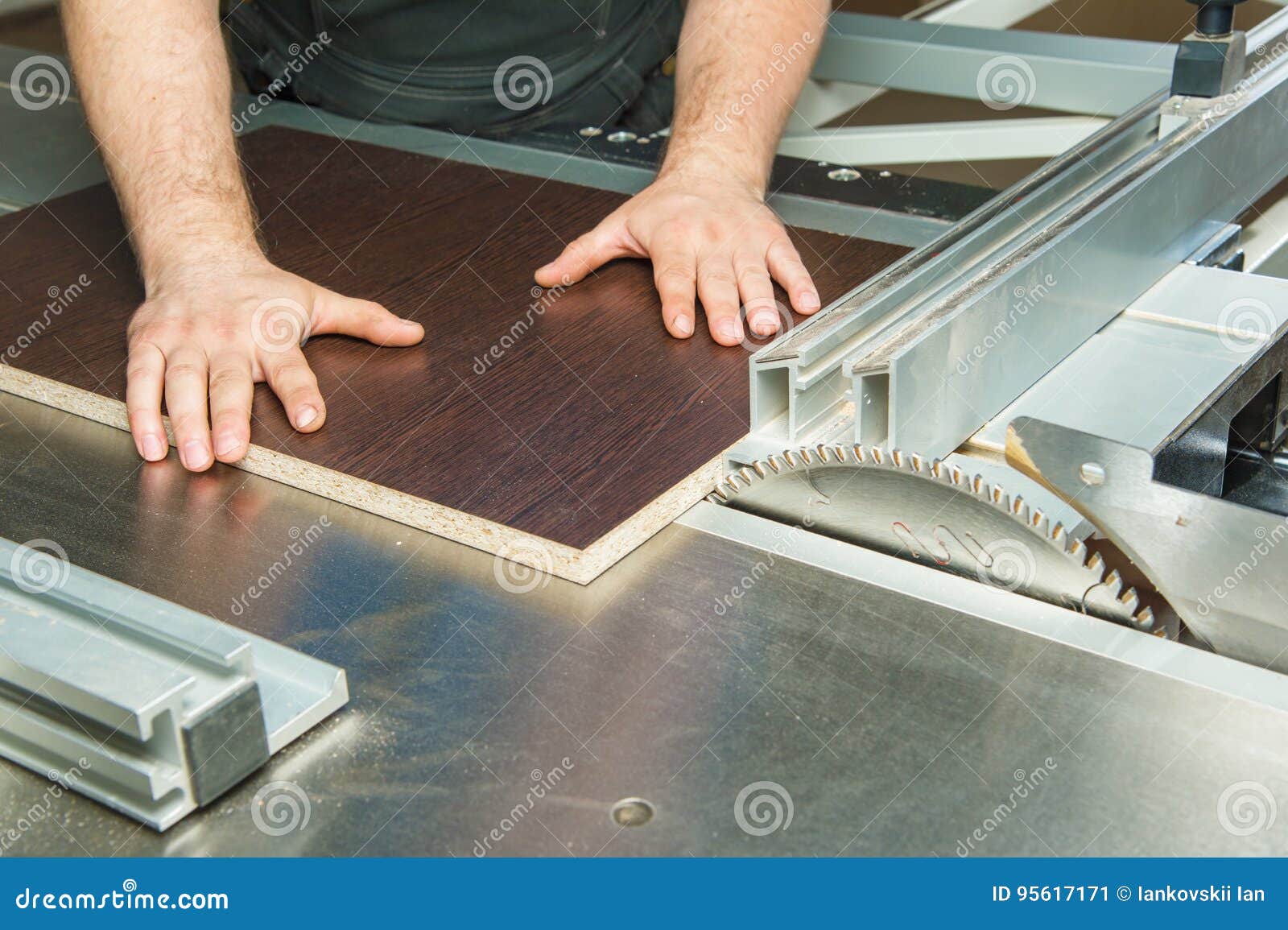 The Master Prepares the Workpiece for Cutting on a Circular Machine ...