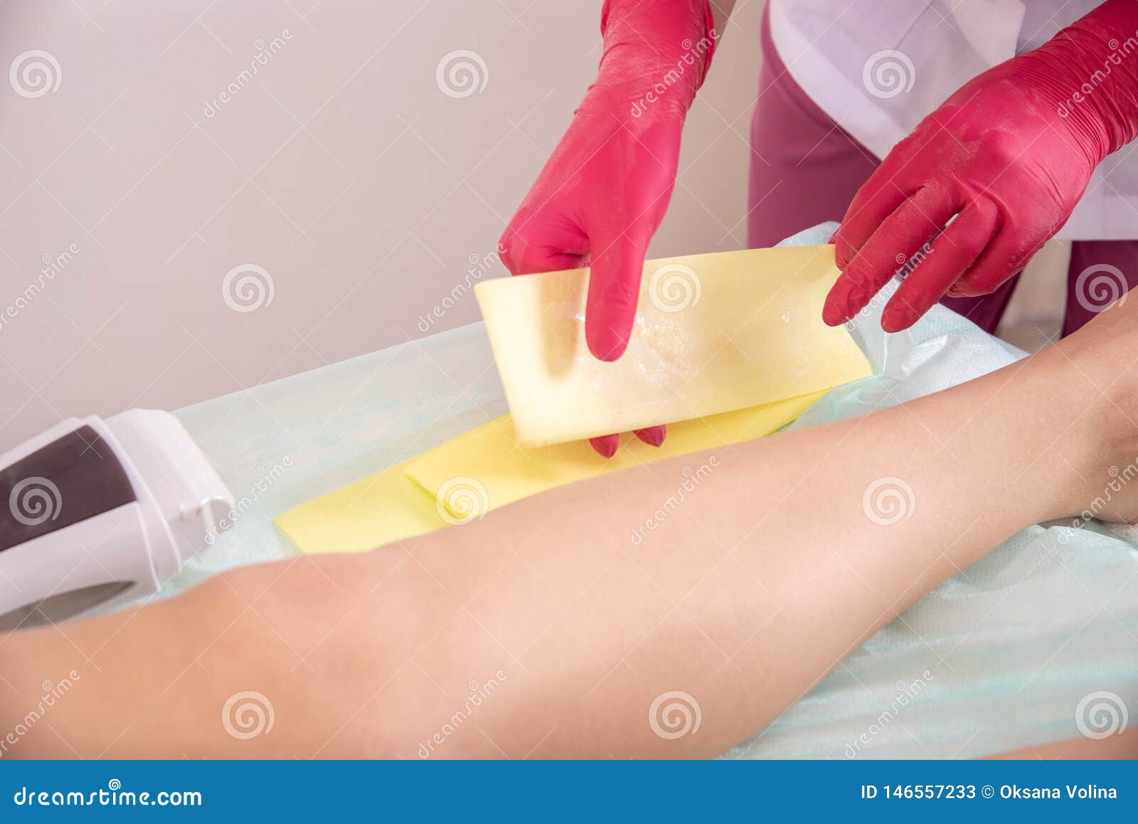Master in Gloves Makes the Procedure of Waxing Female Legs Stock Image ...