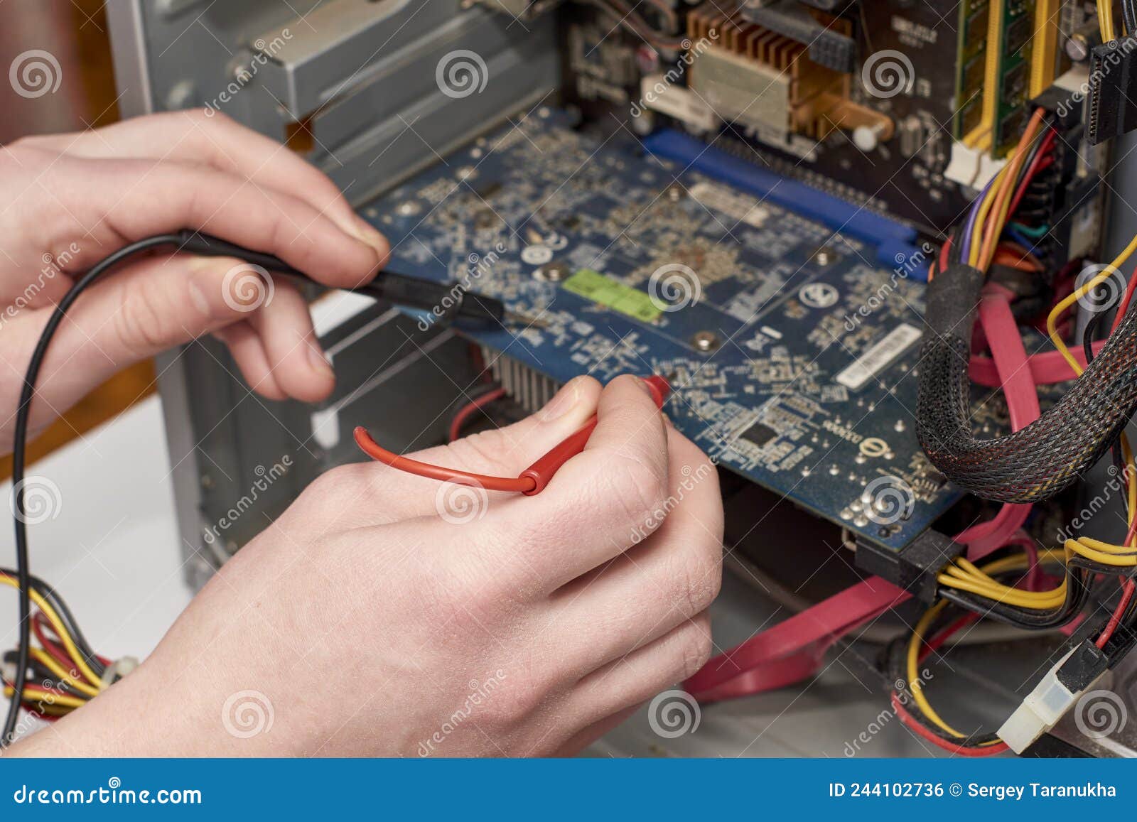 The Master Repairs the Computer Measures the Voltage on the Board with ...