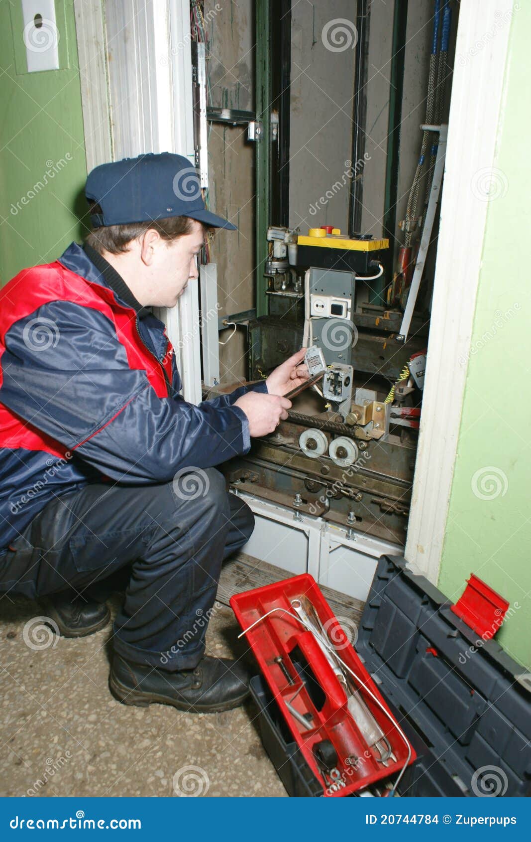 Master repairs the lift editorial stock image. Image of background ...
