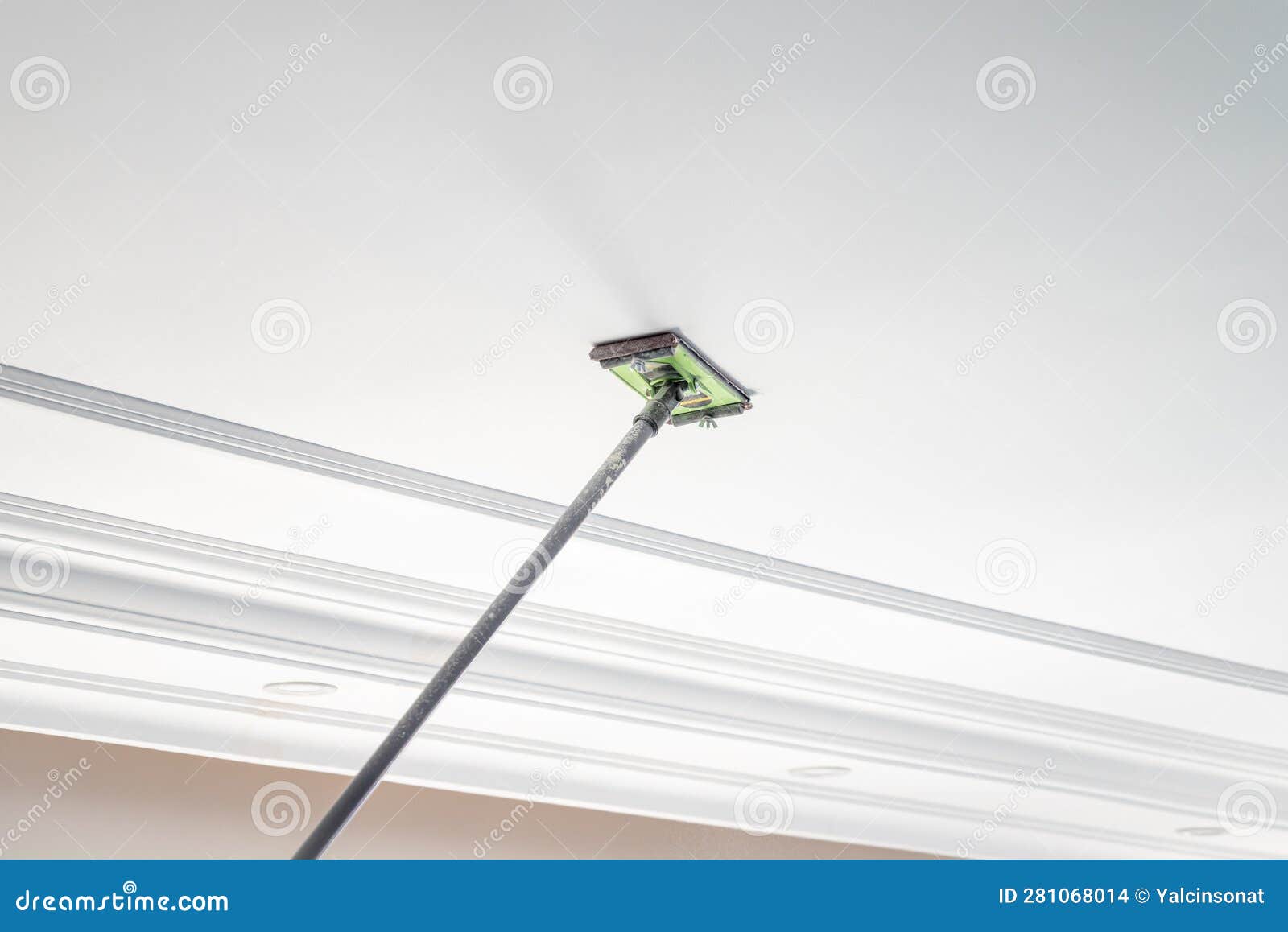 The Master Sanding the Plaster on the Ceiling Stock Photo - Image of ...