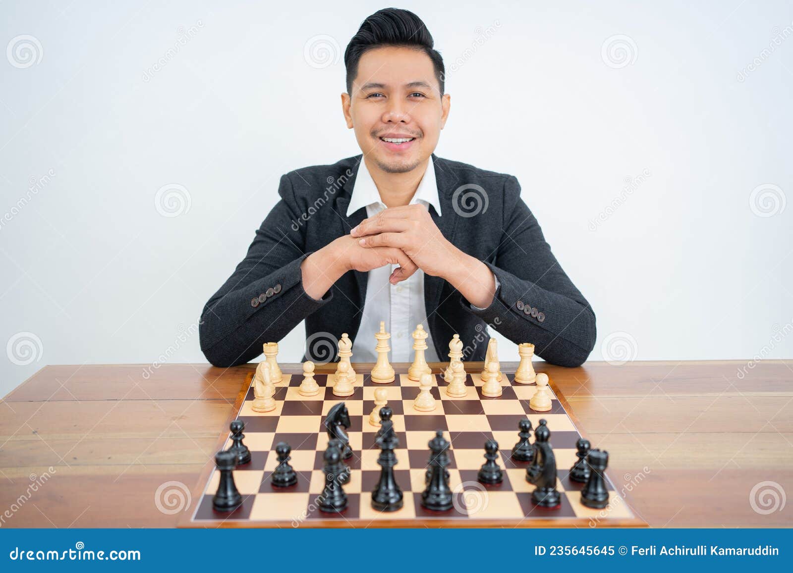 A Master Smile with Chess Pieces on a Chessboard Stock Image - Image of ...