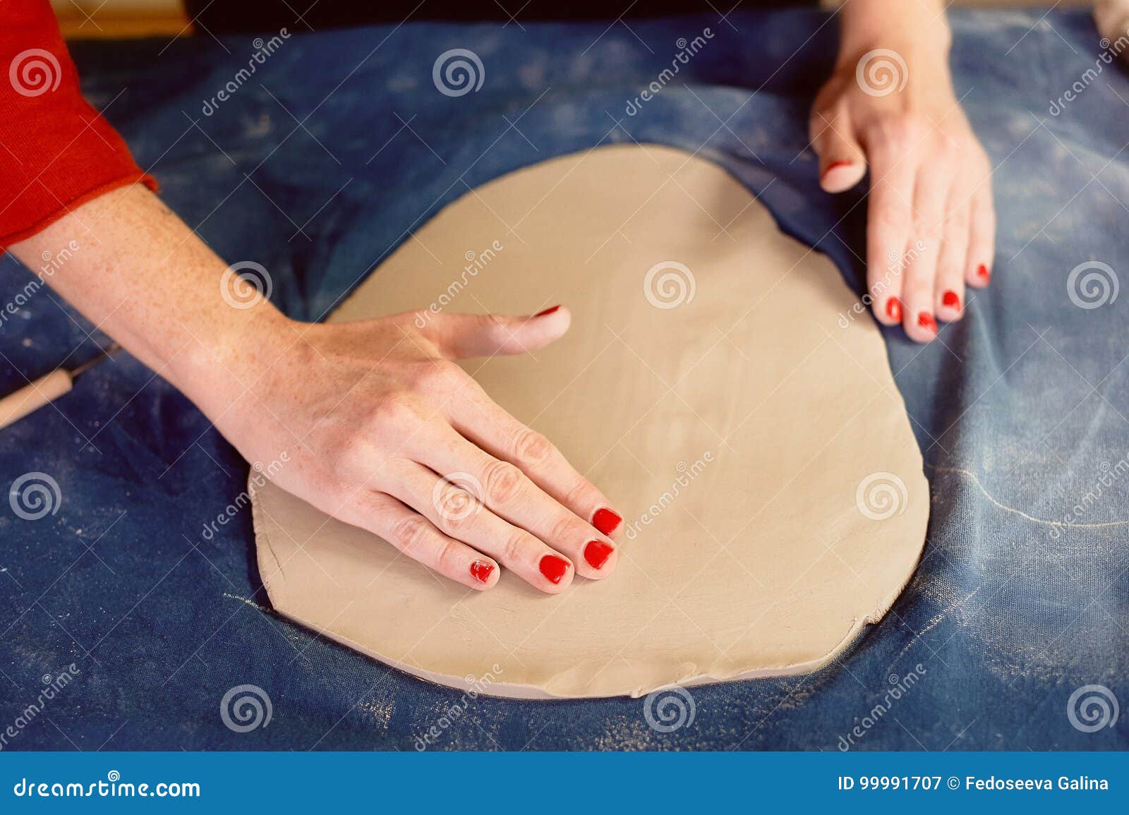 Master Smoothes the Layer of Clay with Your Hands.the Ceramist ...