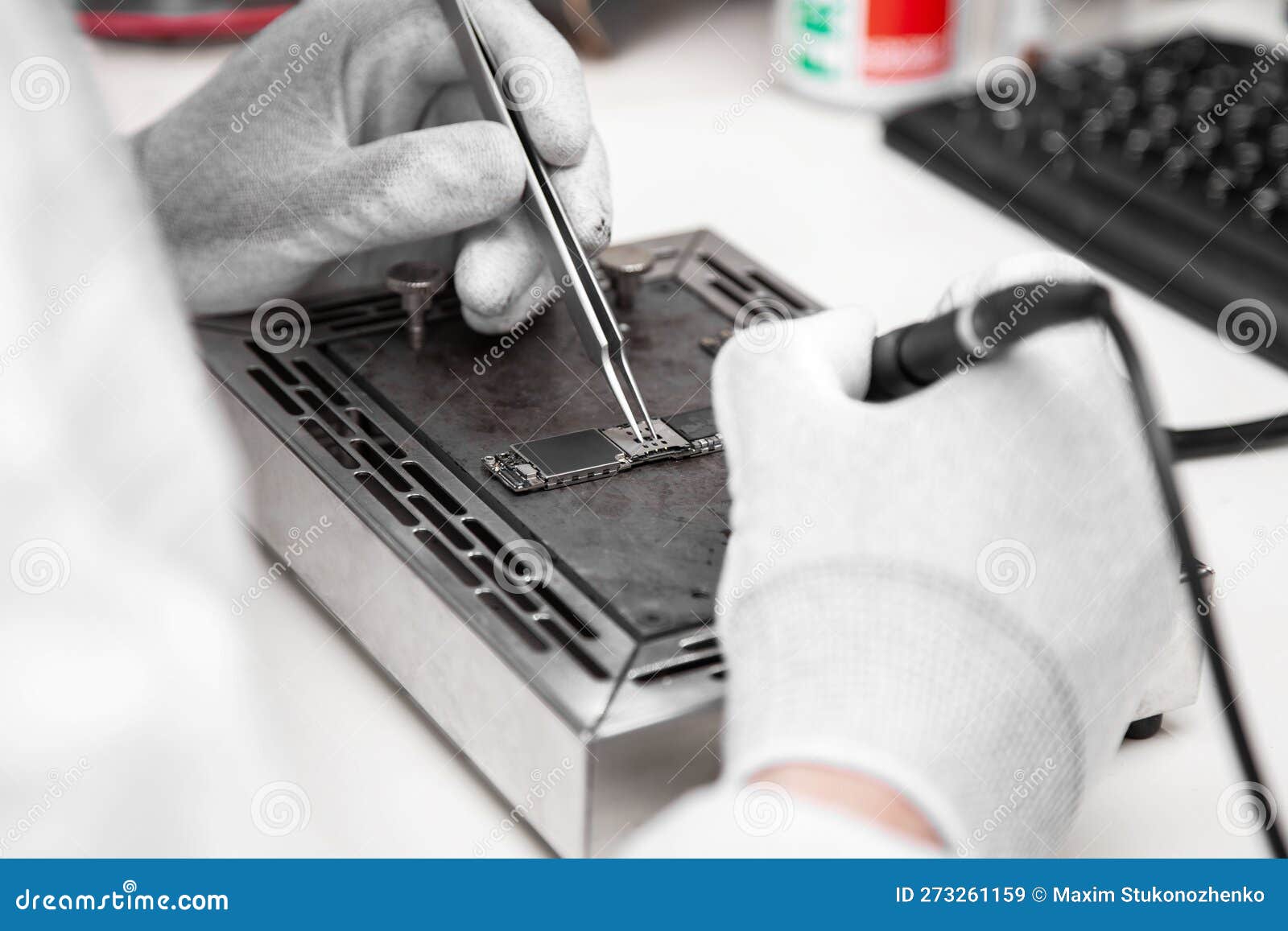 The Master Solders the Microchip.. Service Center. Repair of ...