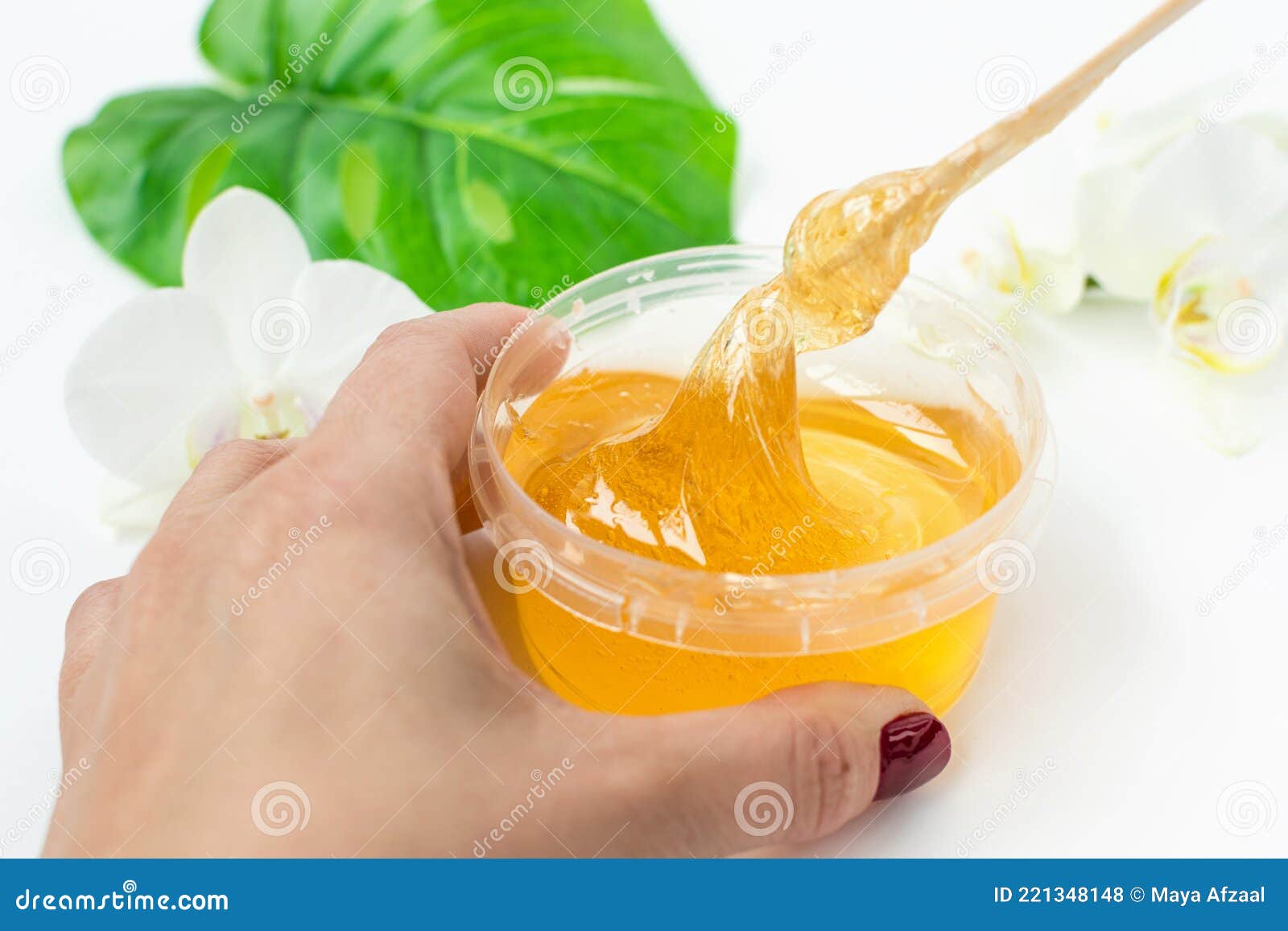 A Master Stir the Sugar Paste before Removing Unwanted Hair. Sugaring ...