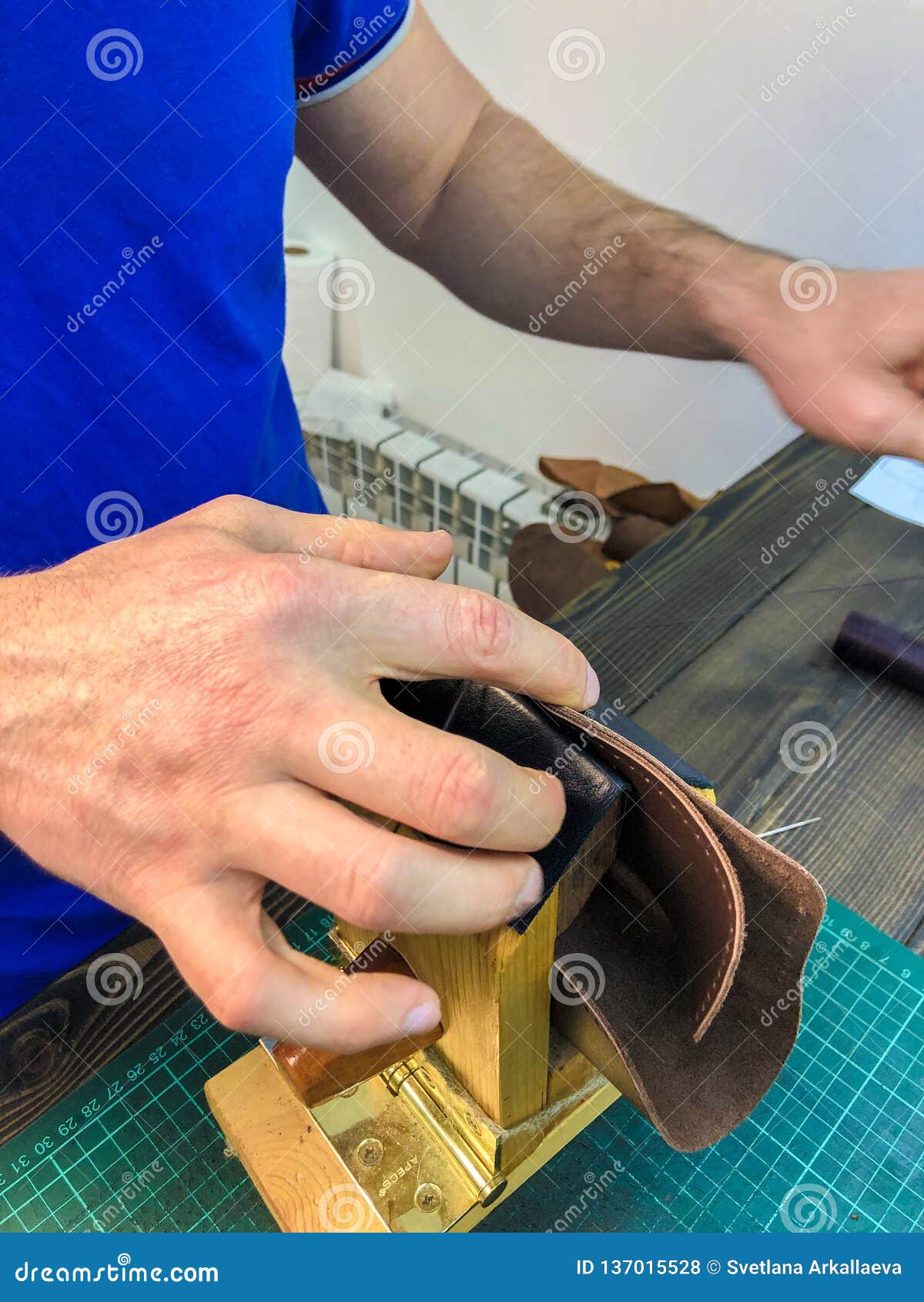 Master Stitches the Workpiece, Hand Stitch Needle on the Skin Stock ...