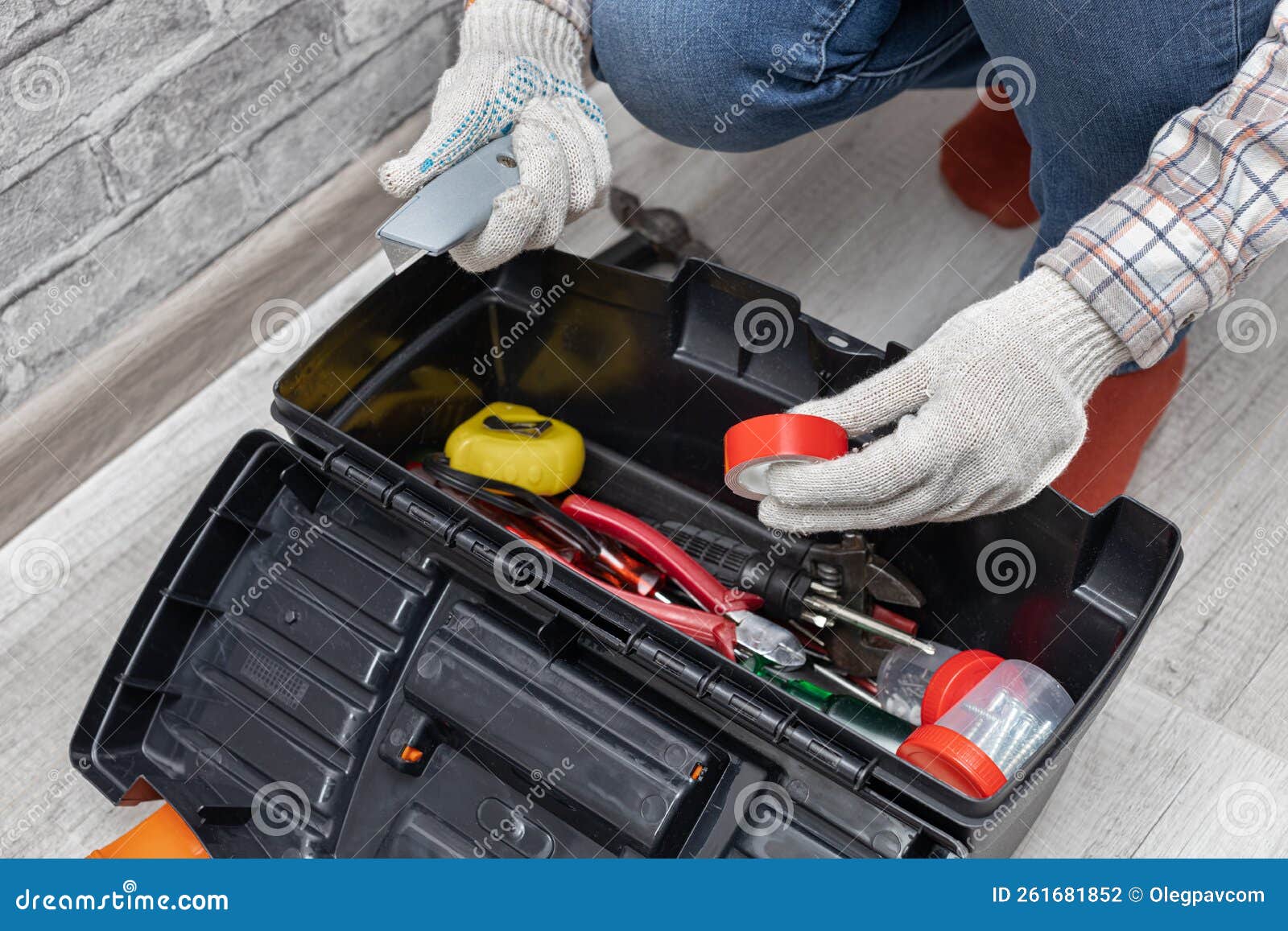 The Master Takes the Tool Out of the Tool Box Stock Photo - Image of ... The Master Takes the Tool Out of the Tool Box Stock Photo - Image of ...