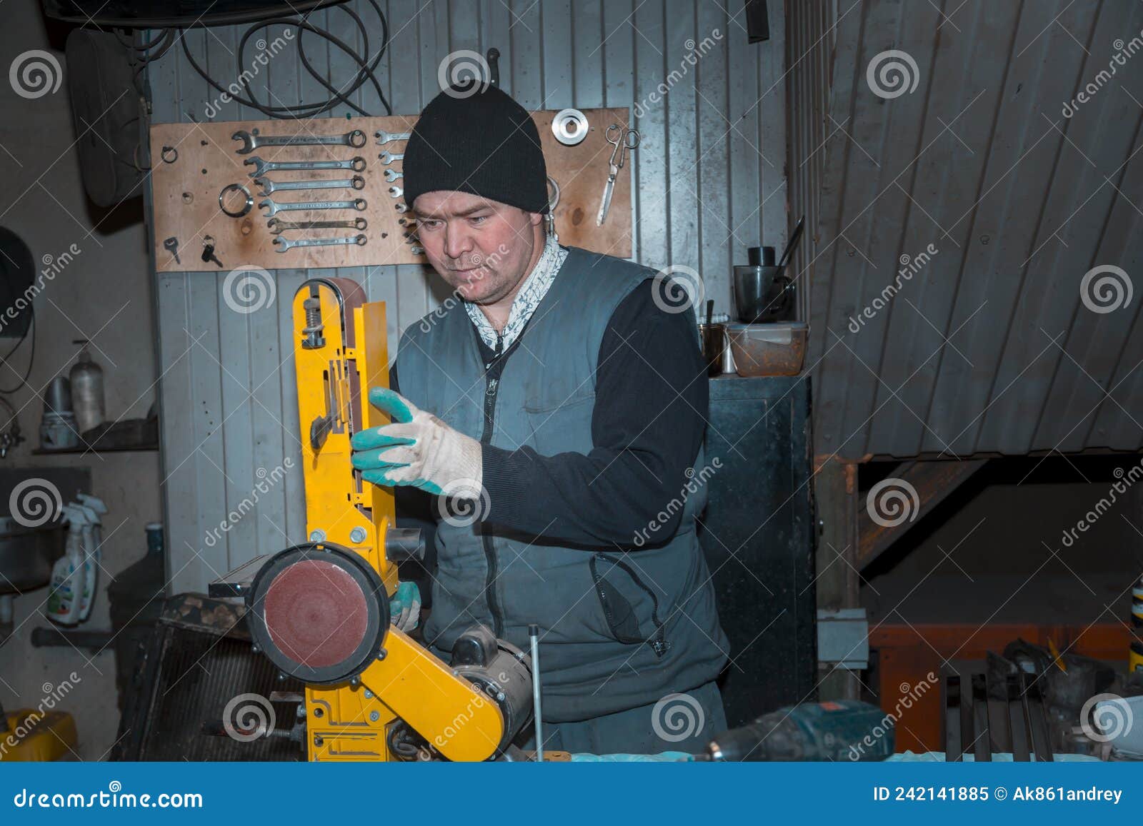 Locksmith Processes a Part on an Emery Machine Stock Image - Image of ...