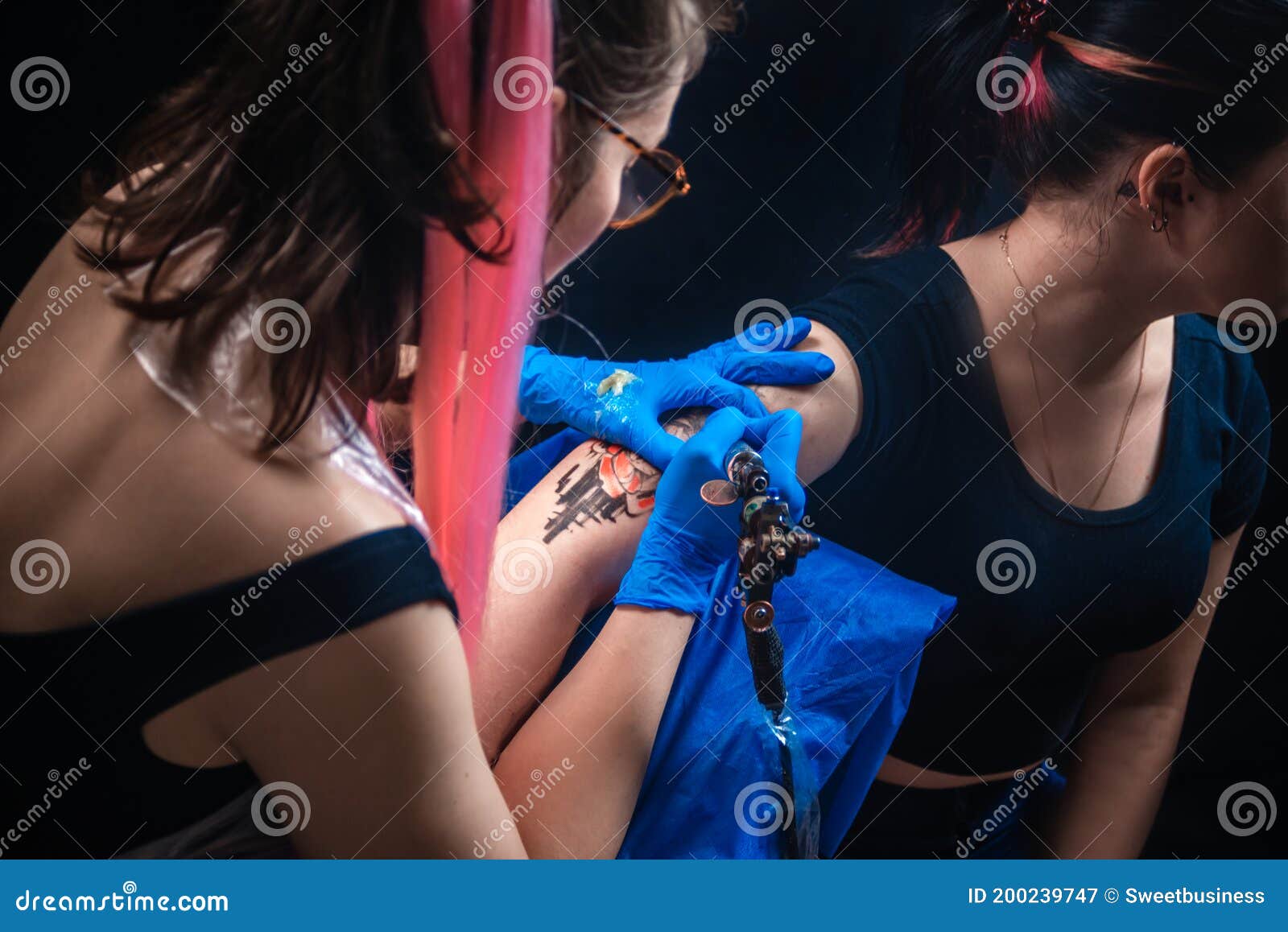 Tattooist Showing Process of Making a Tattoo Stock Image - Image of ...