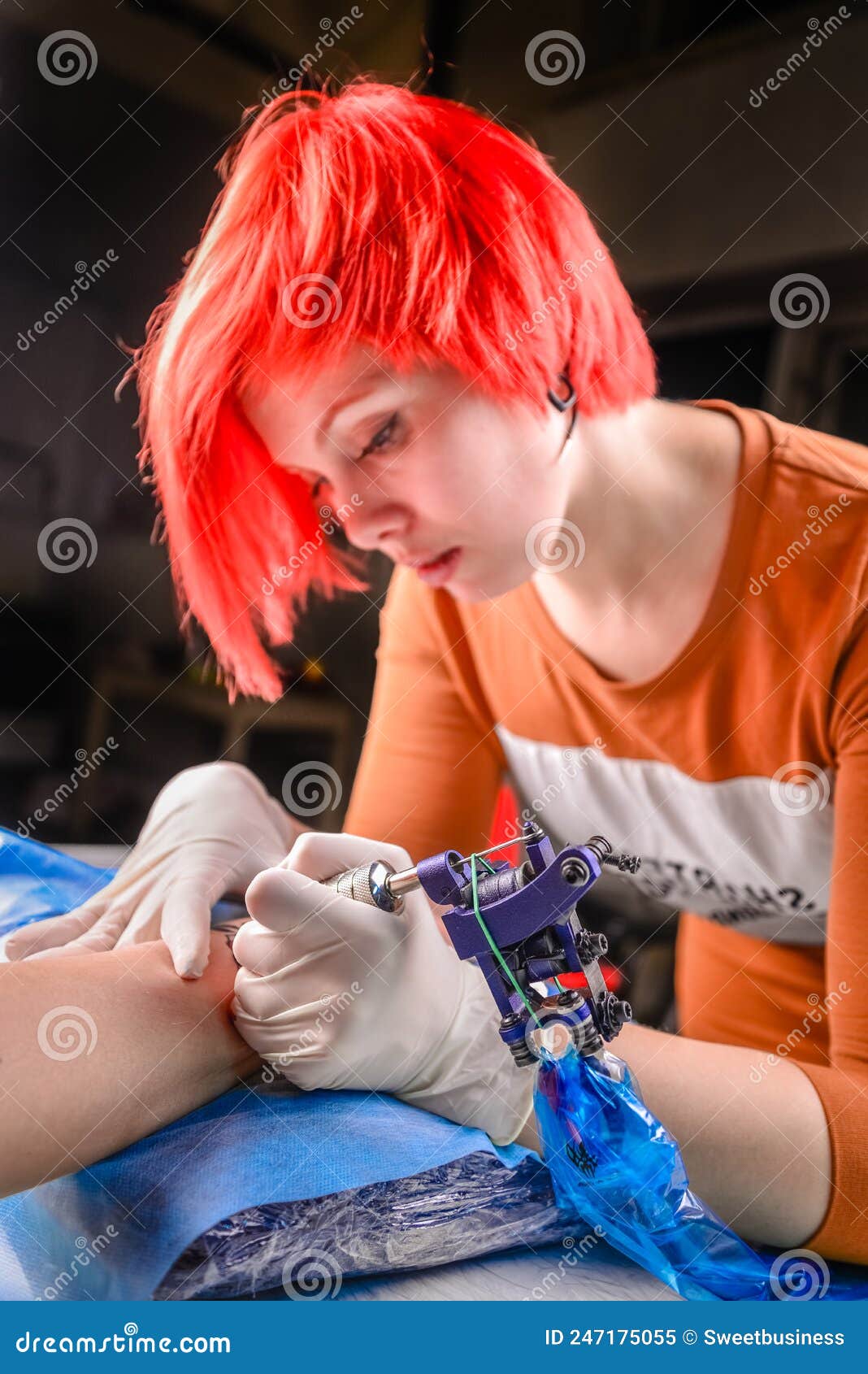 Professional Tattooer Demonstrates the Process of Getting Tattoo in ...