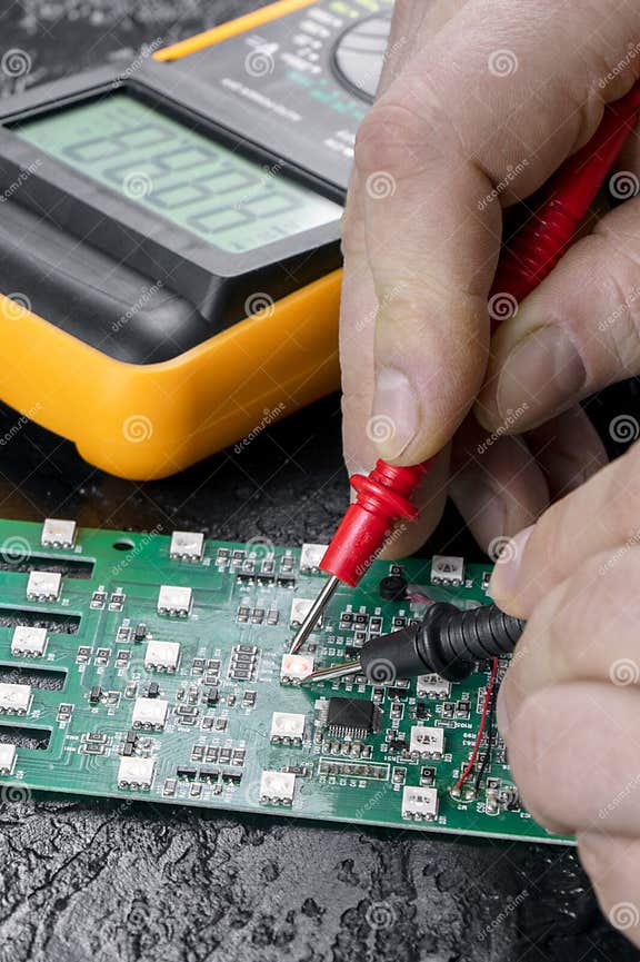 The Master Tests the LEDs on the Microcircuit Using a Multi-meter ...