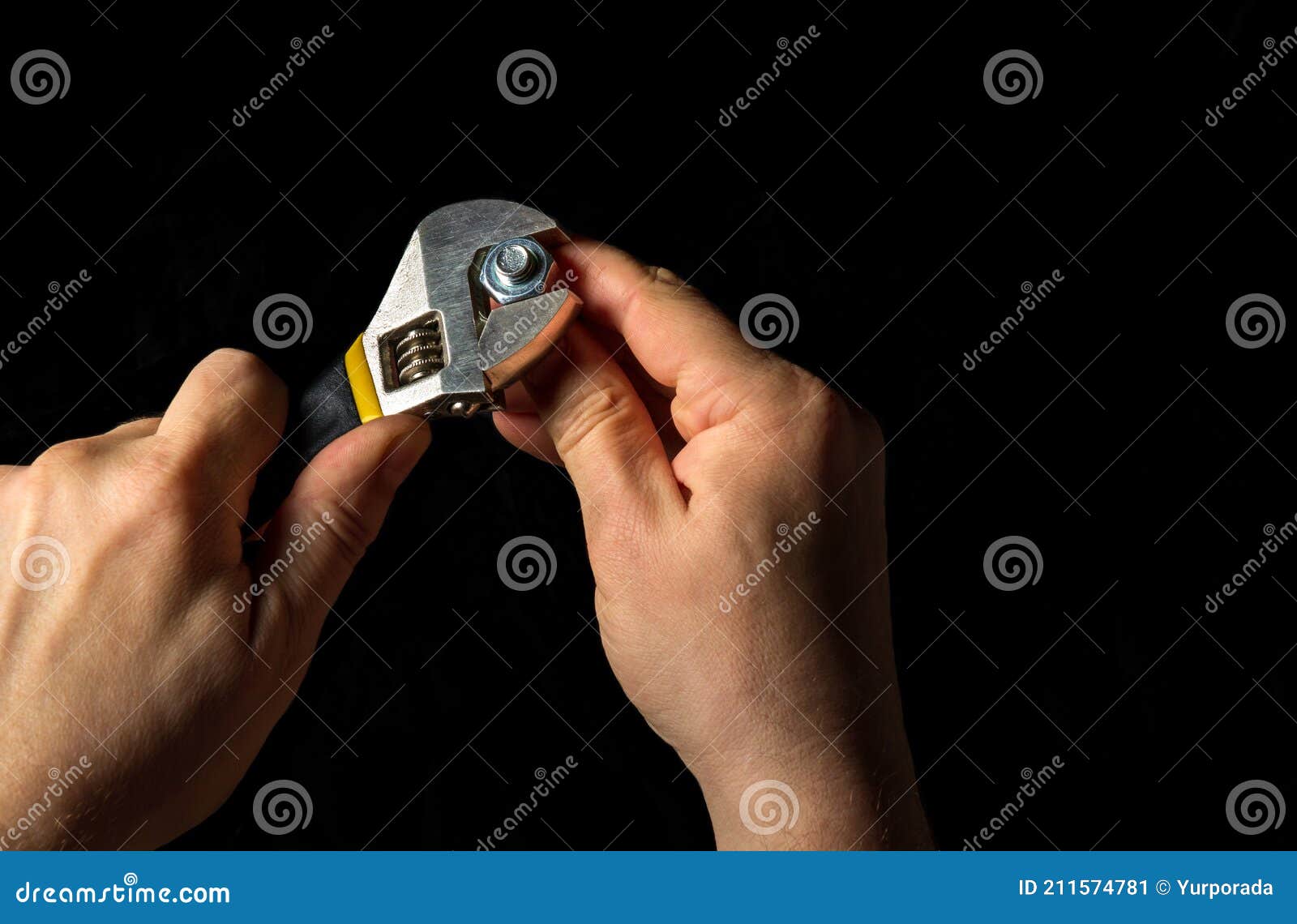 The Master Tighten the Nut with a Adjustable Wrench in the Bolt Close ...