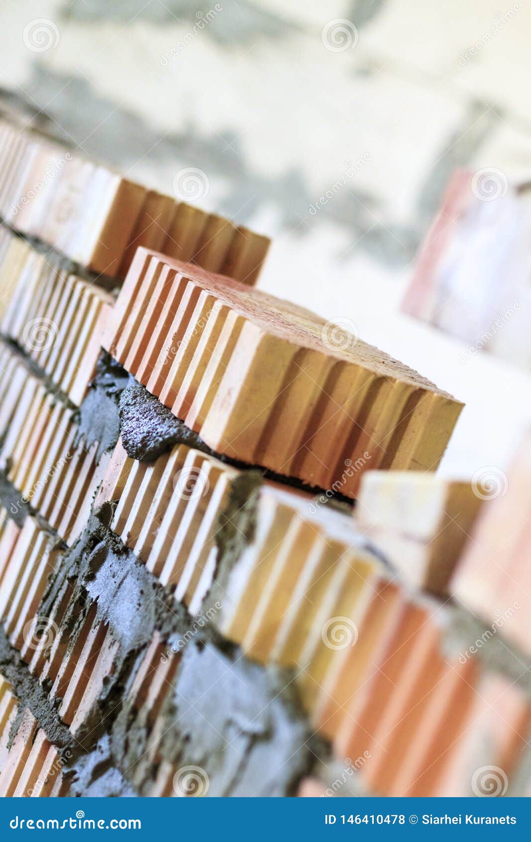 Master with a Tool, Stacks a Red Brick. There is Illumination and ...