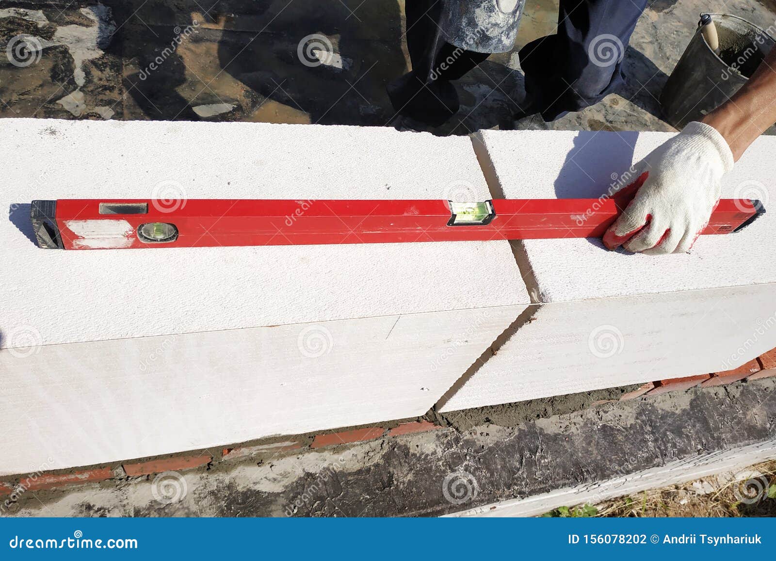 The Master Uses the Level in the Construction and Masonry of the House ...