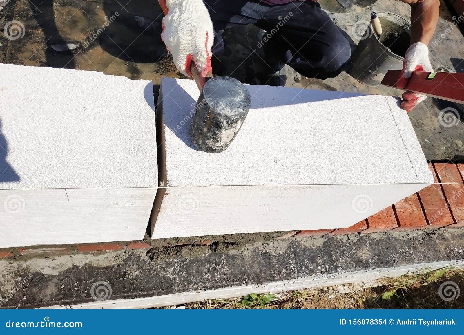 The Master Uses the Level in the Construction and Masonry of the House ...