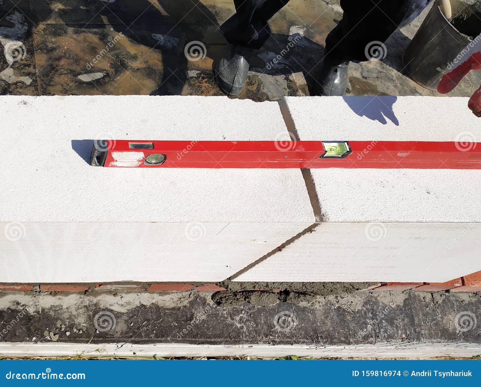 The Master Uses the Level in the Construction and Masonry of the House ...