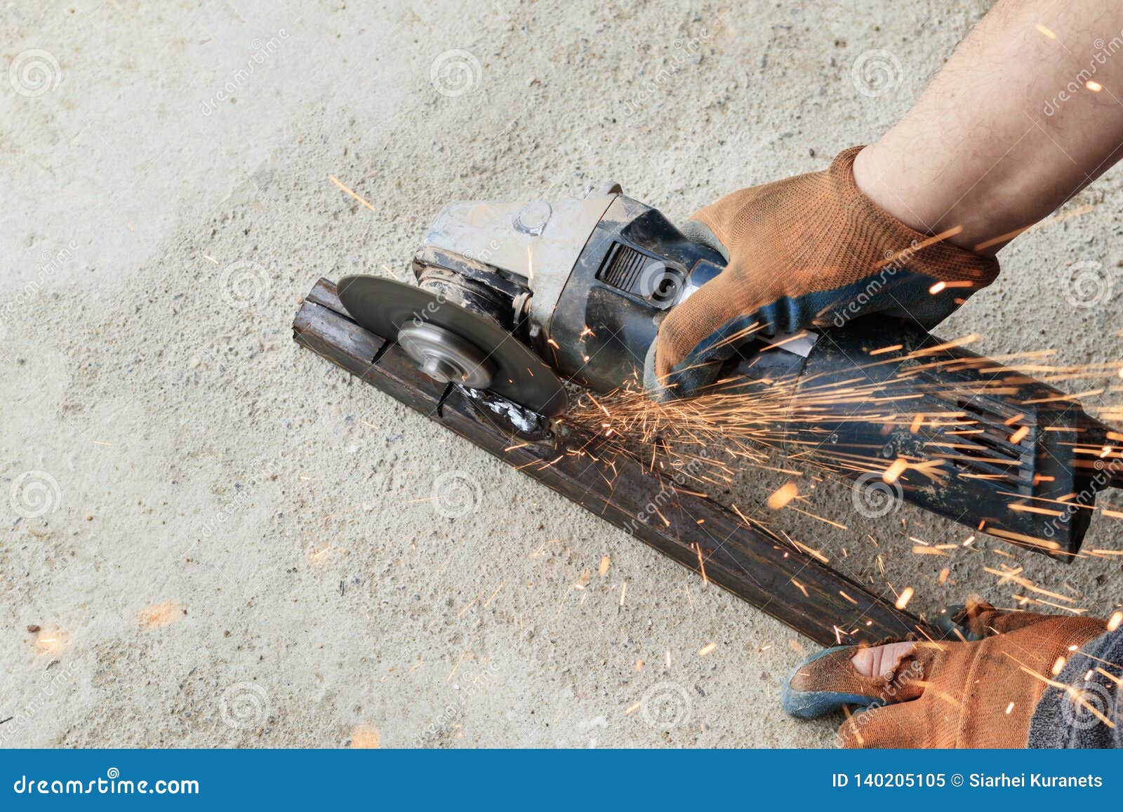 Master Using Grinders. a Lot of Sparks Burn and Work. Cuts a Square ...
