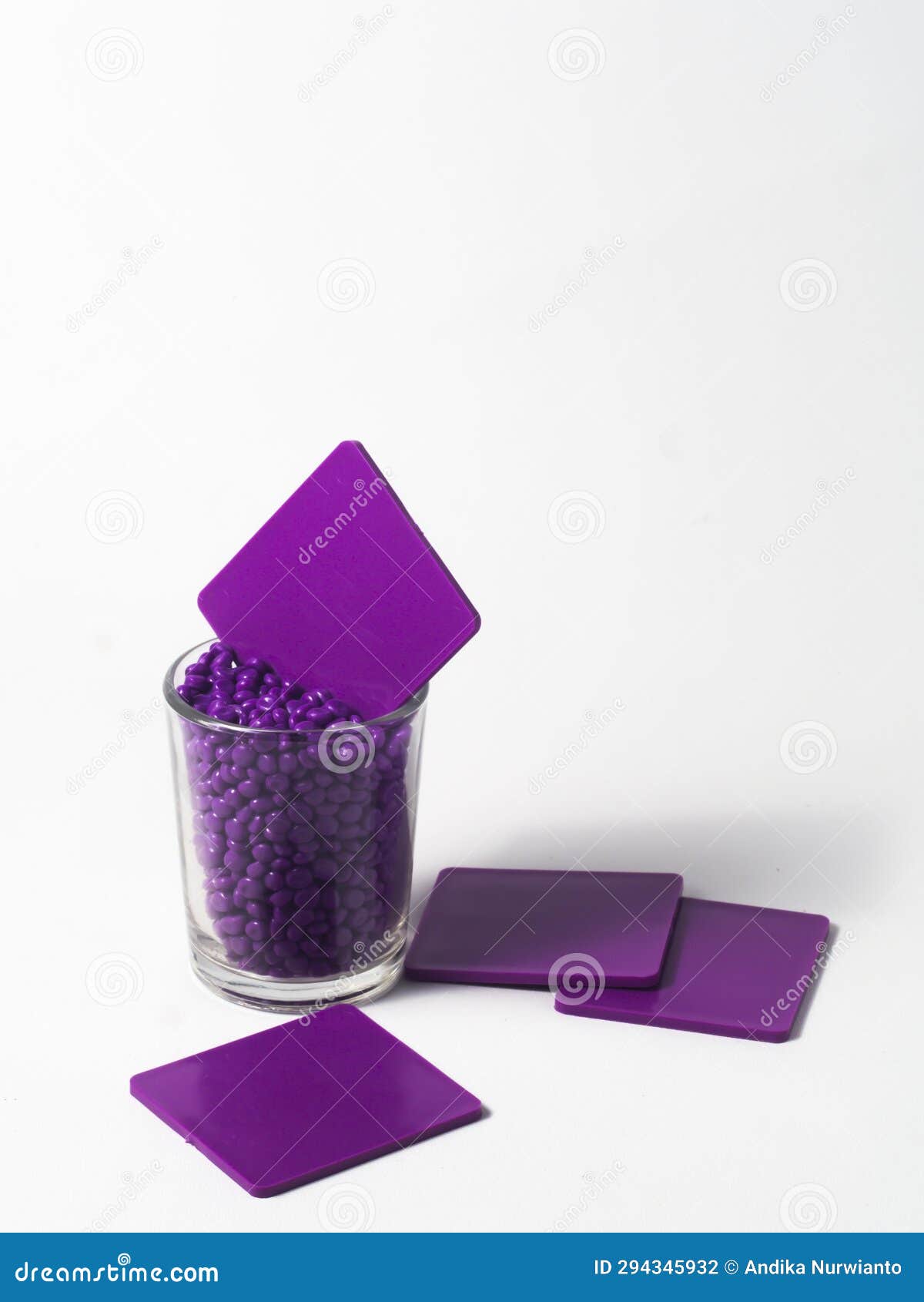 Masterbatch Polymer Granules and Purple Color Chips on a White ...