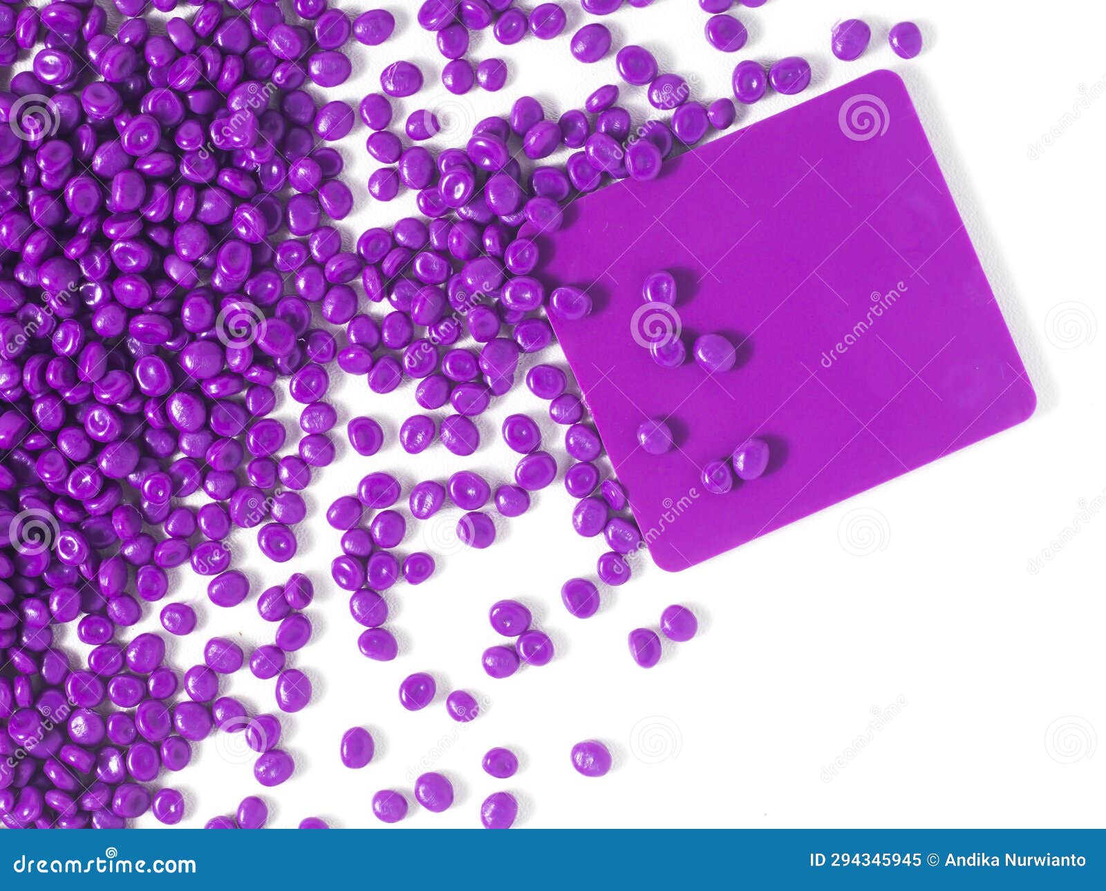 Masterbatch Polymer Granules and Purple Color Chips on a White ...