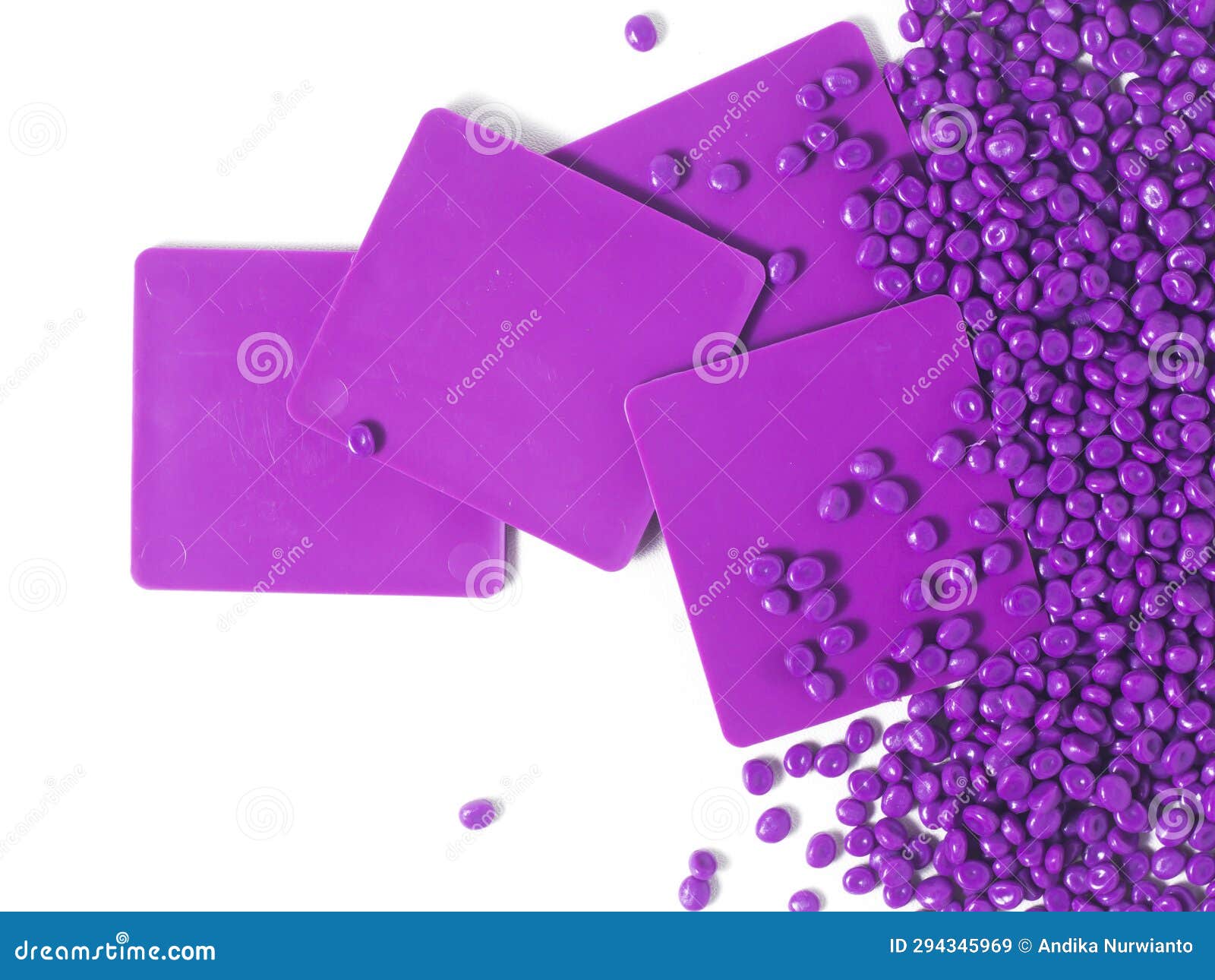 Masterbatch Polymer Granules and Purple Color Chips on a White ...