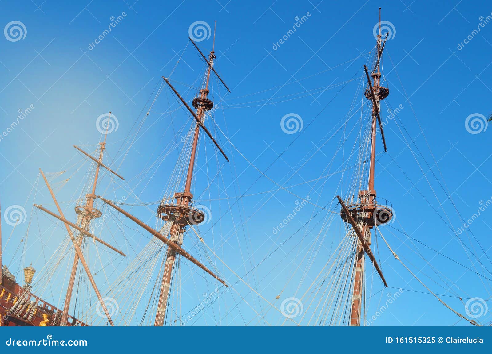 The Masts of an Ancient Sailing Ship with Lowered Sails in Front of the ...