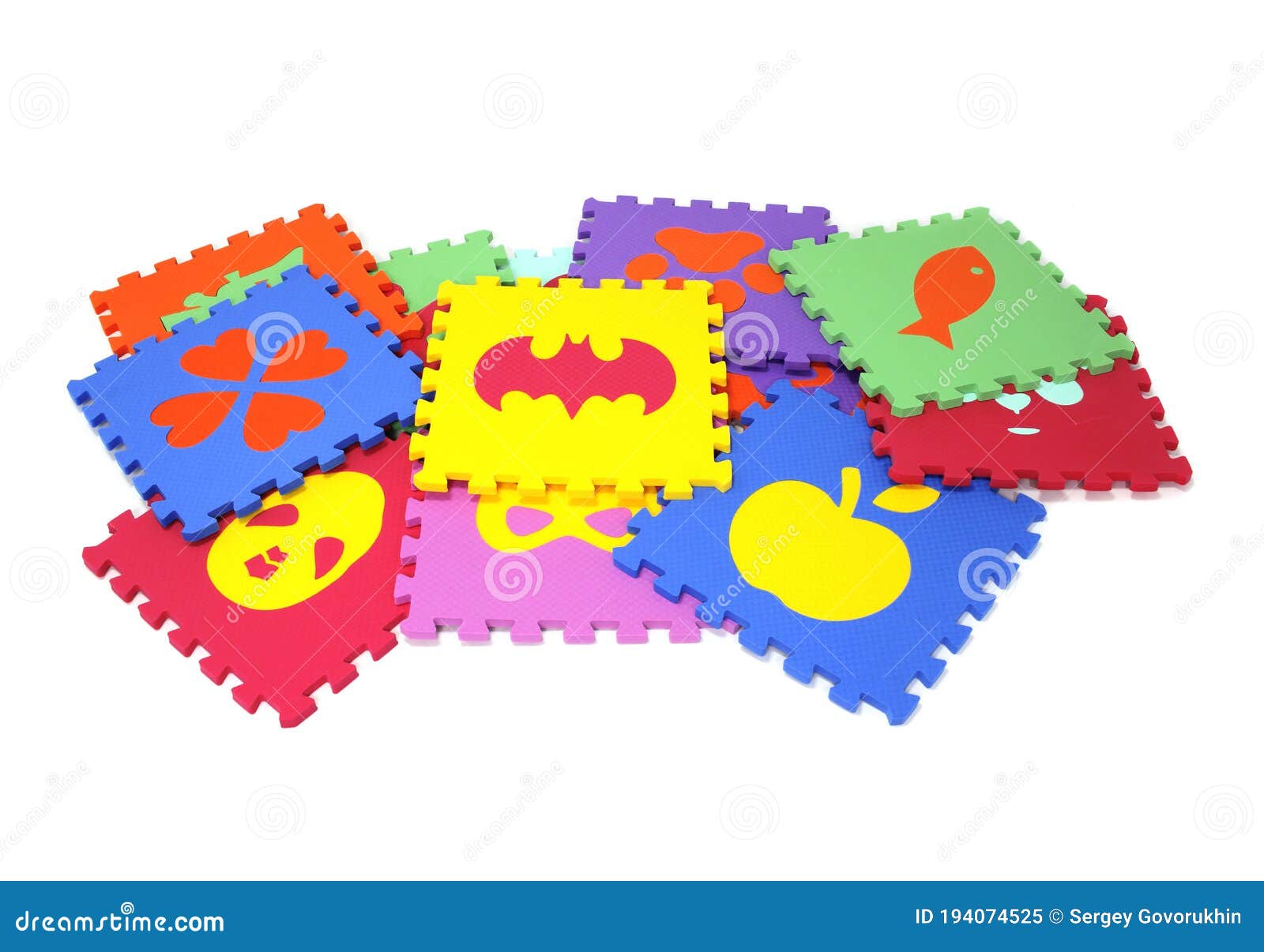 Mat Puzzle Figures - Multicolored Soft Elements on a White Background ...