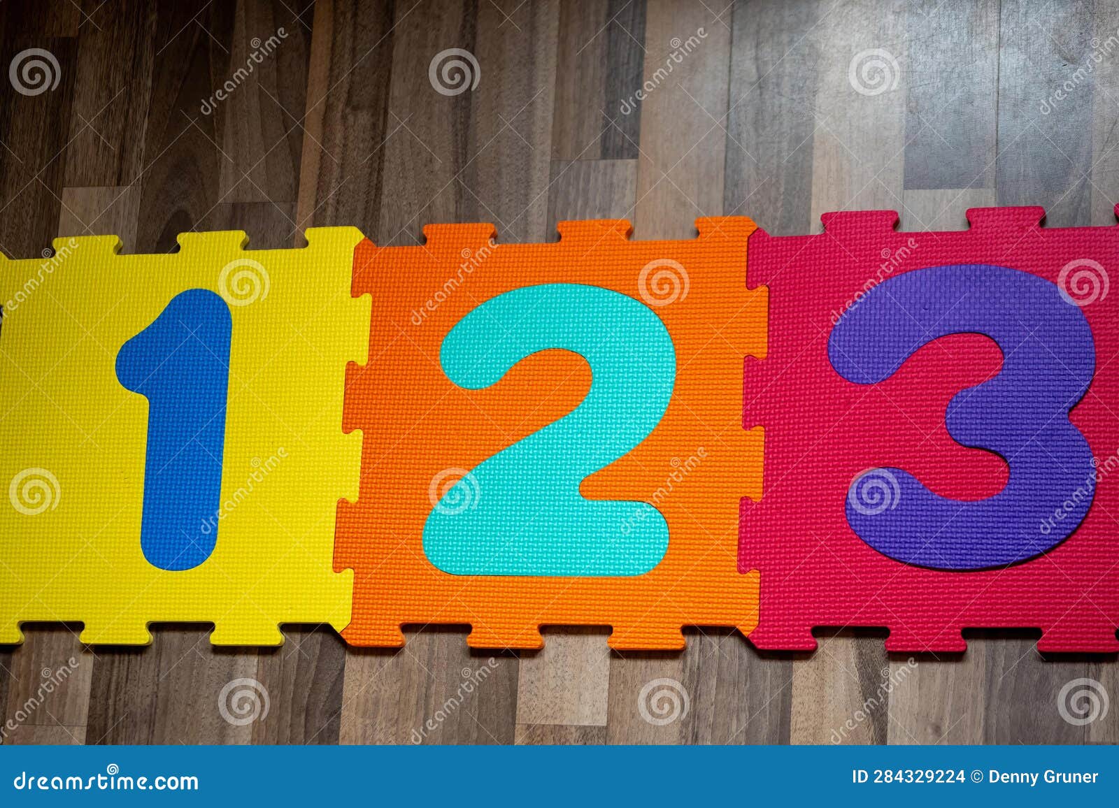 A Mat Puzzle with the Numbers One Two and Three Stock Photo - Image of ...
