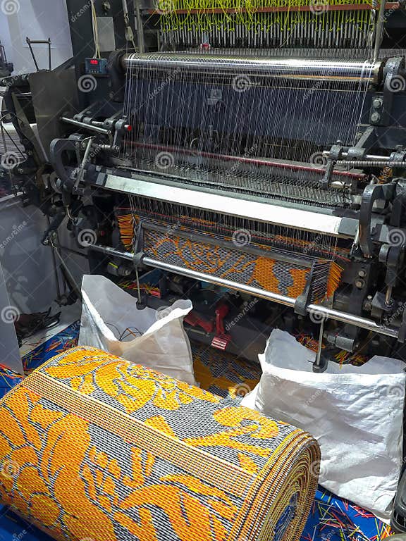 Mat weaving machine stock photo. Image of manufacture - 344481302