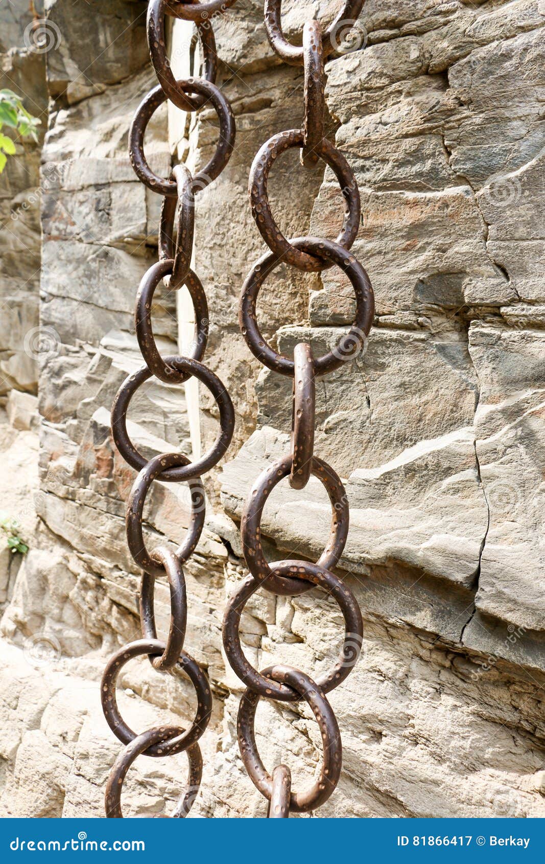 Matal Chains Pairs Hanging by the Side of a Rock Side Stock Image ...