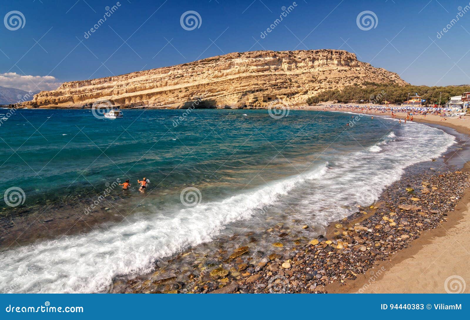 Matala beach stock image. Image of boat, harmony, light - 94440383