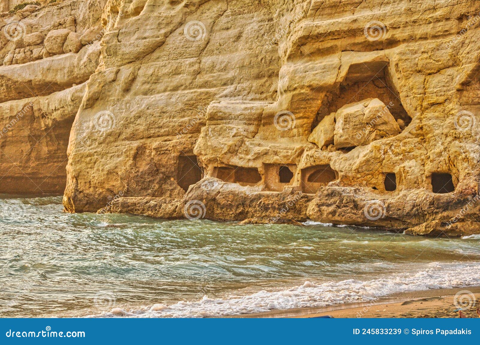 Matala caves Crete stock image. Image of crete, street - 245833239