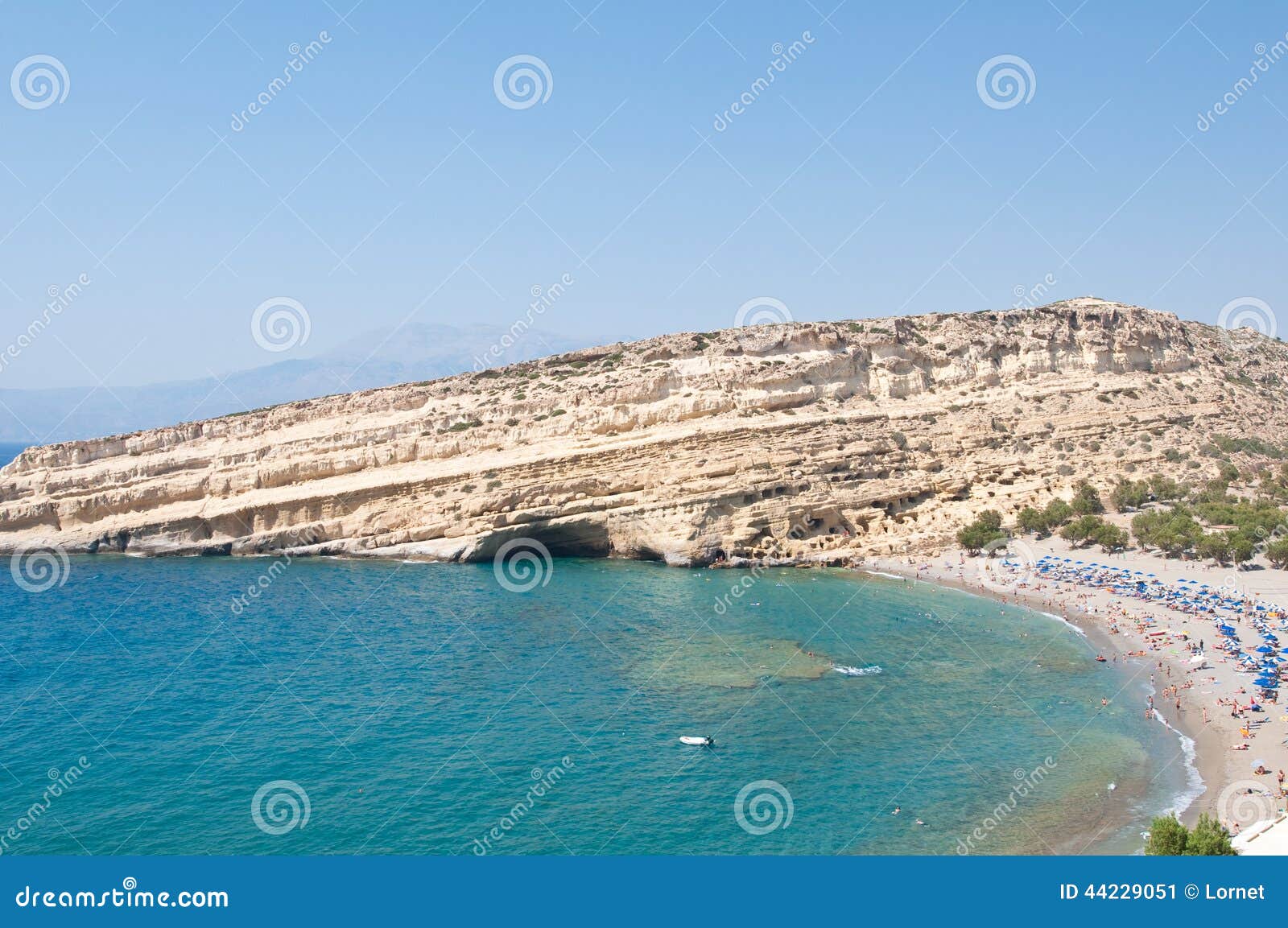 Matala Hippy Beach with Caves on the Crete Island, Greece. Stock Image ...