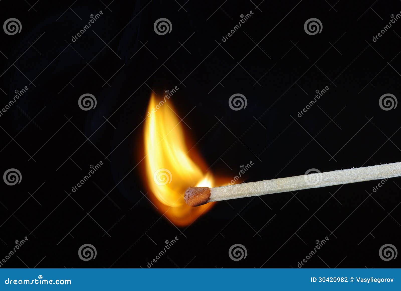The Match Lights Up on the Black Isolated Background Stock Photo ...