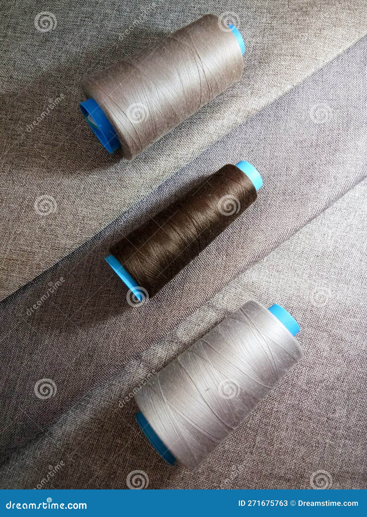 Sewing Thread with fabric stock image. Image of blue - 271675763