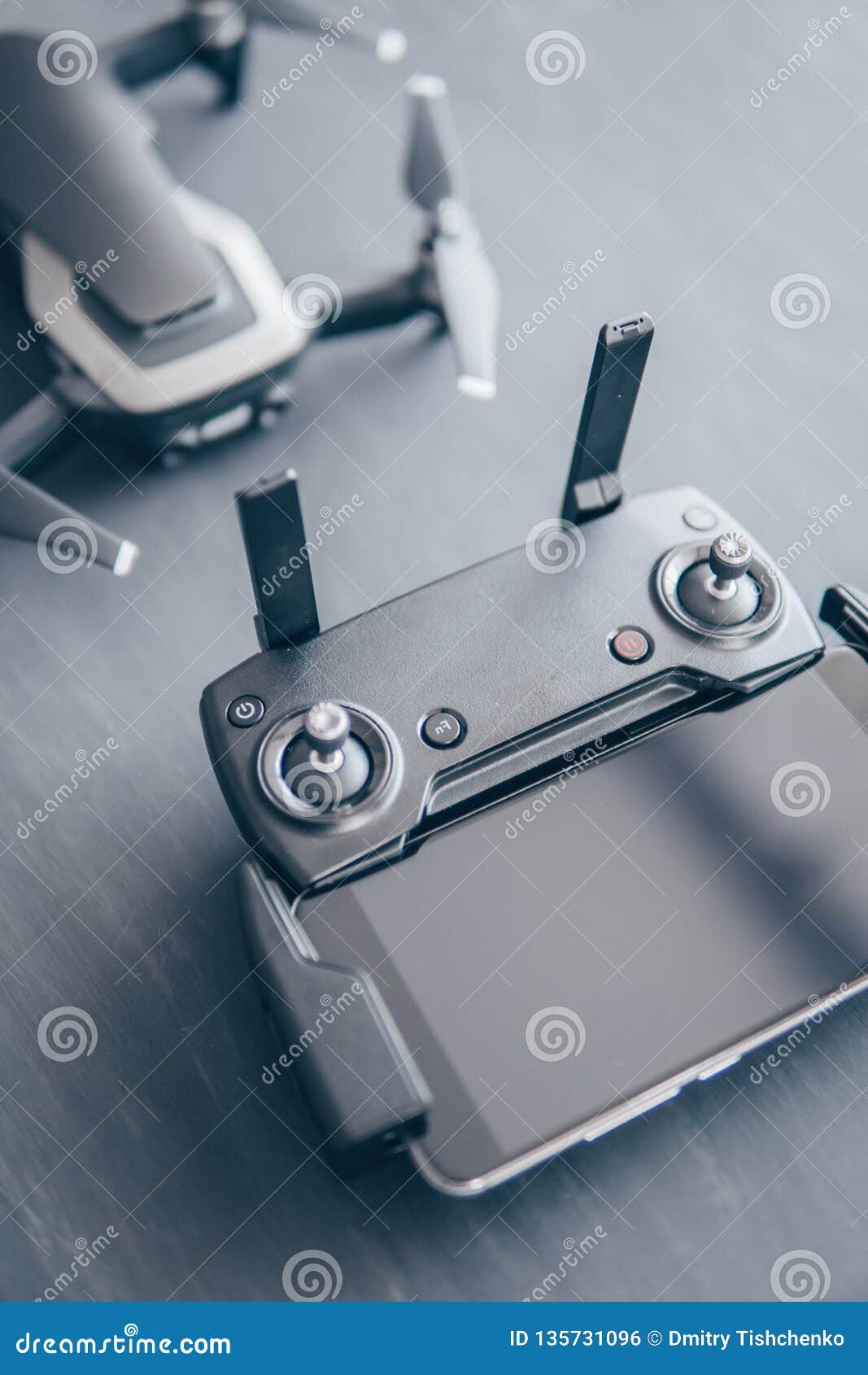 Mate Color. a New Black Drone on a Black Table. Vertical Shot . the ...