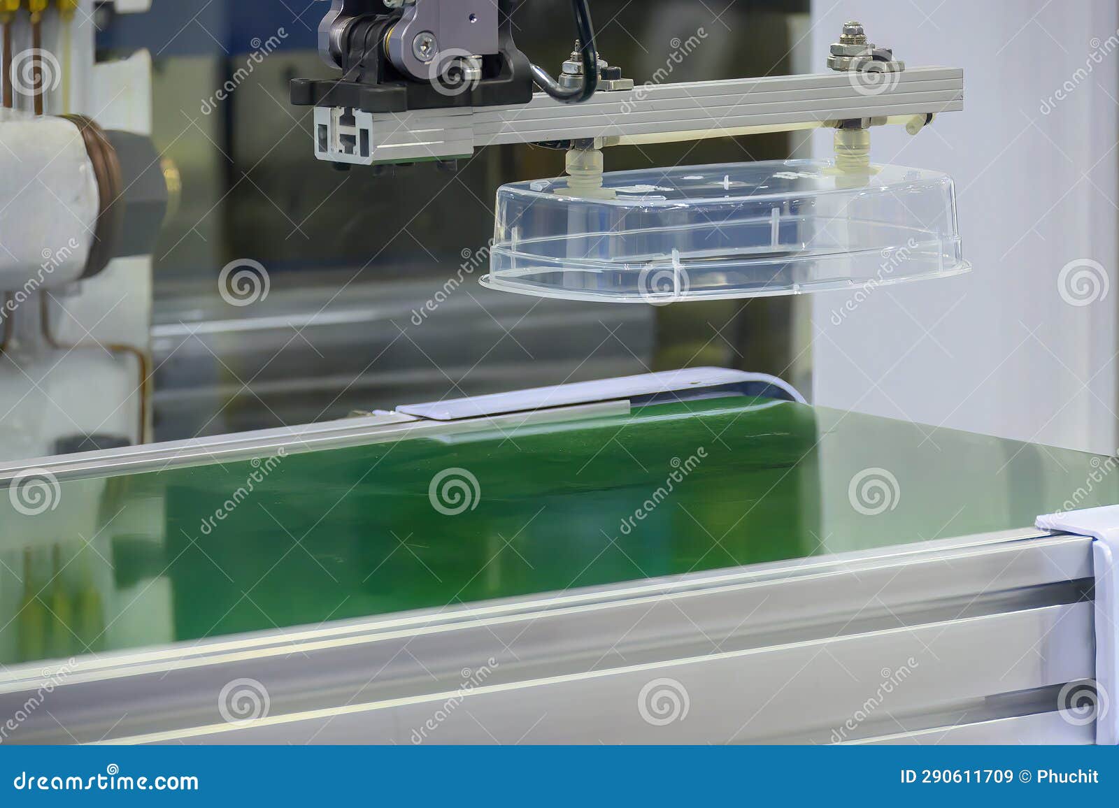The Material Handling Process on Injection Machine Holding the Box ...