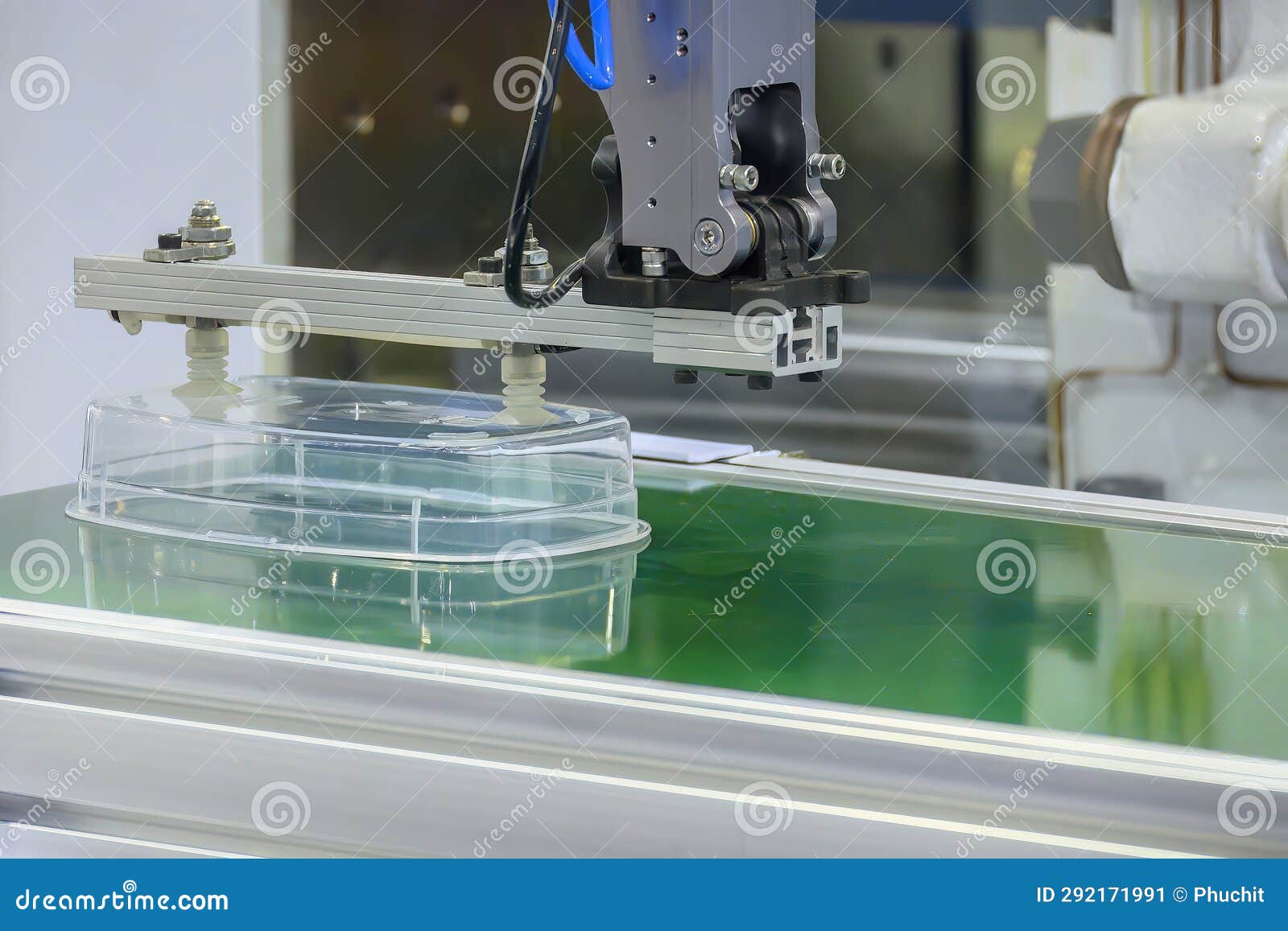The Material Handling Process on Injection Machine Holding the Box ...