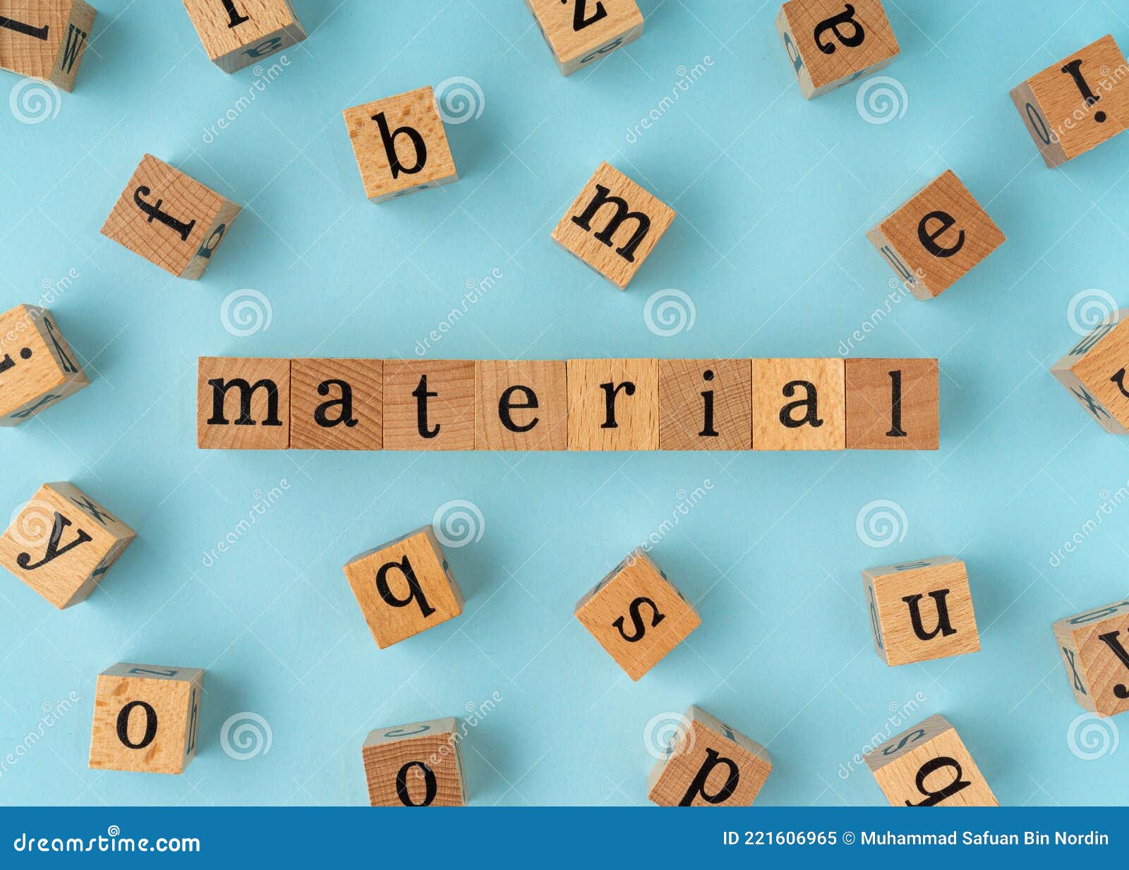 Material Word on Wooden Block. Flat Lay View on Blue Background Stock ...