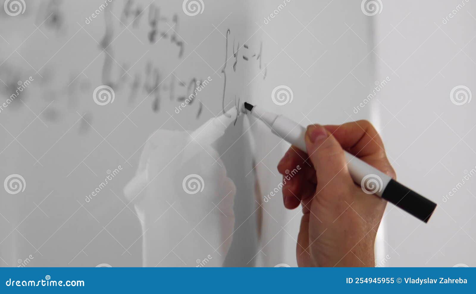 Female Student is Writing Math Equation on Whiteboard in the Cabinet ...