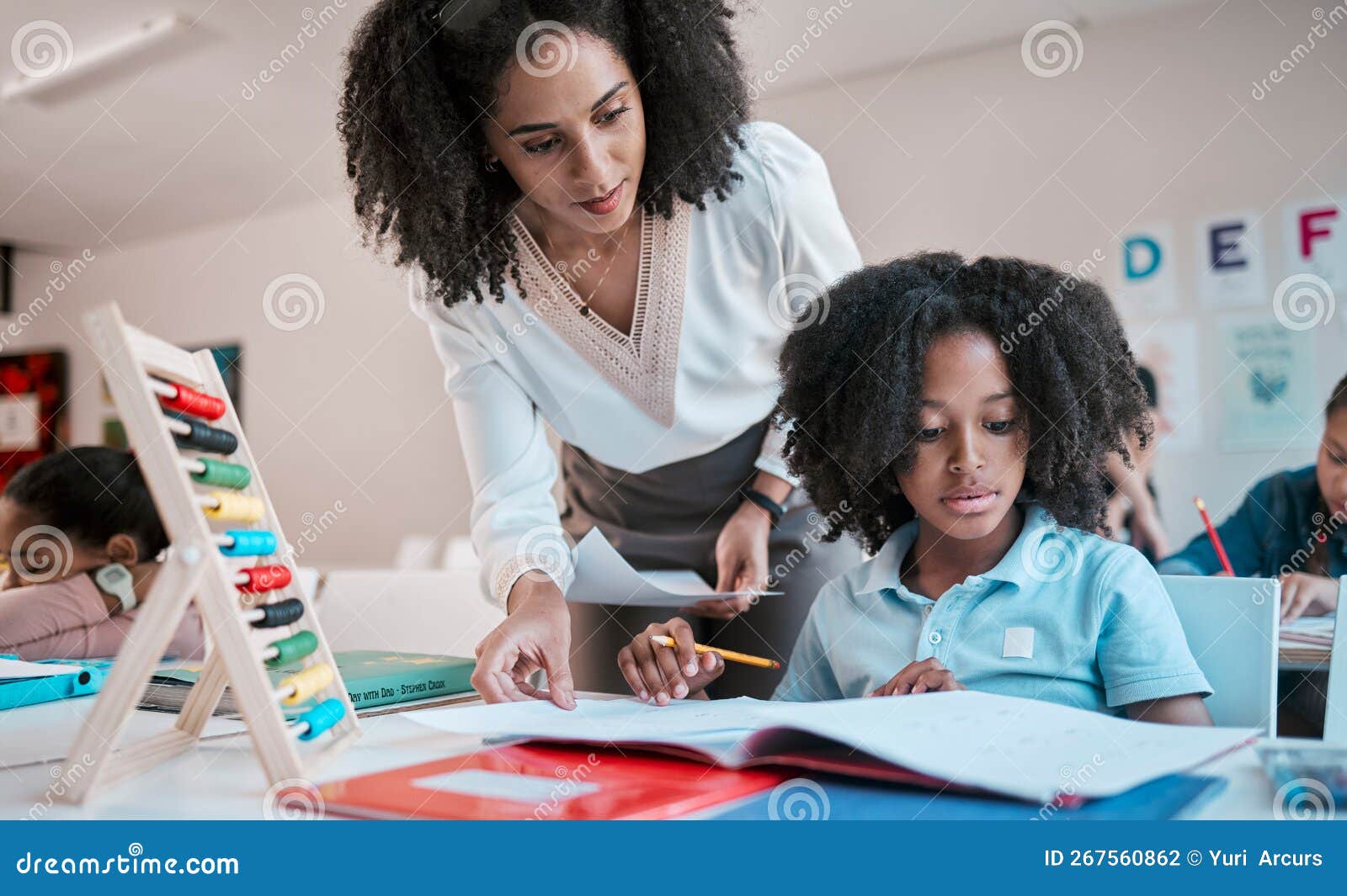 Math, Education or Teacher Helping a Child in a Classroom with Learning ...