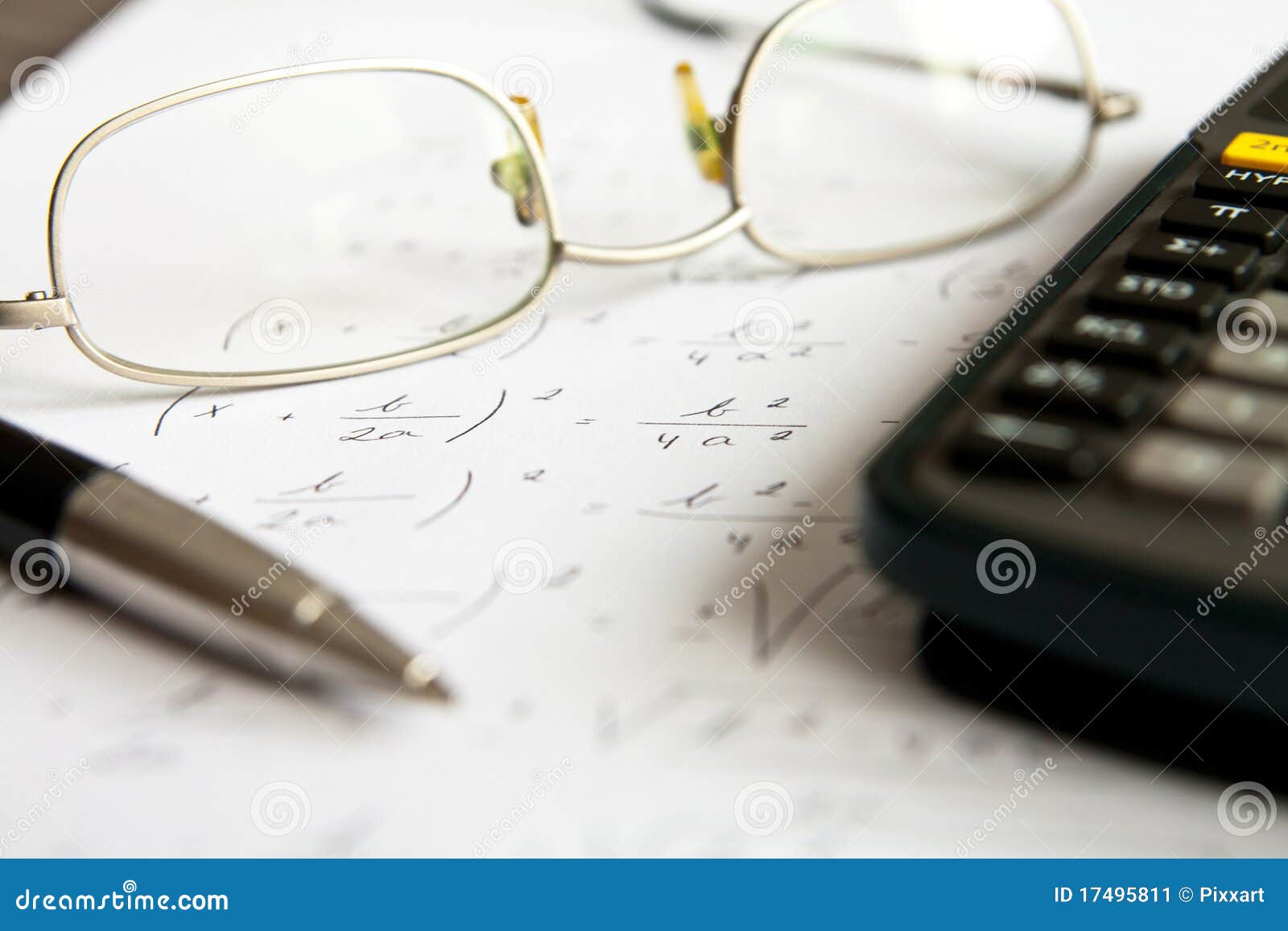 Math Exercise with Glasses, Calculator and Pen Stock Image - Image of ...