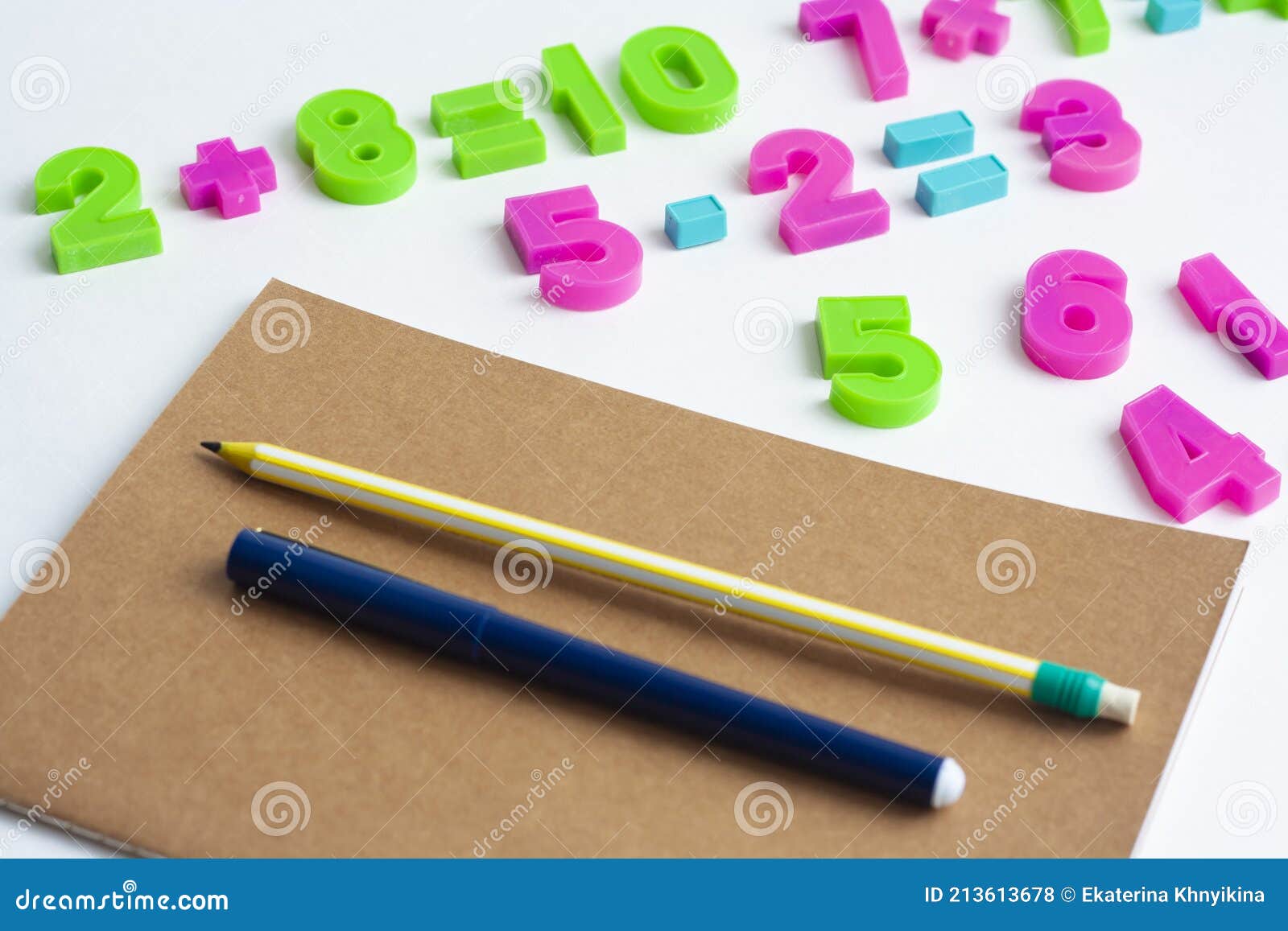 Math Exercises, Notebook, Pen and Pencil on a White Background Stock ...