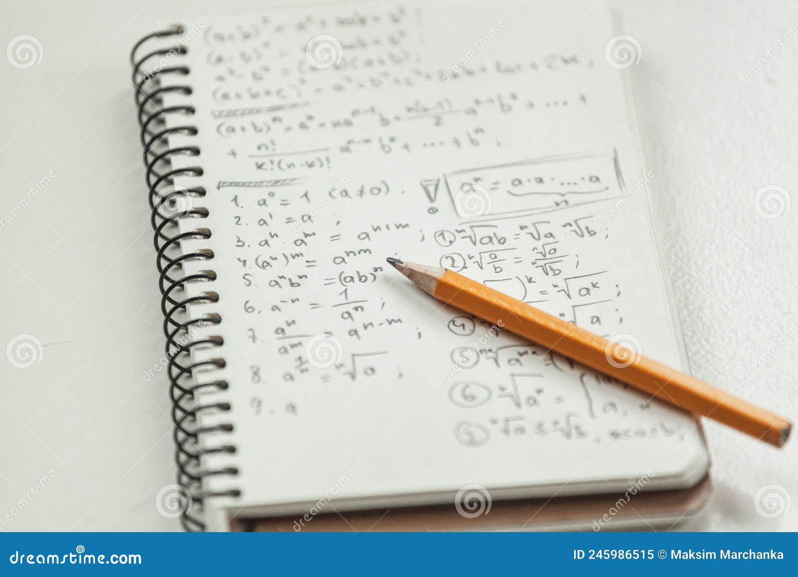 Math Formulas are Written in Pencil on a Piece of Paper, Math Problems ...