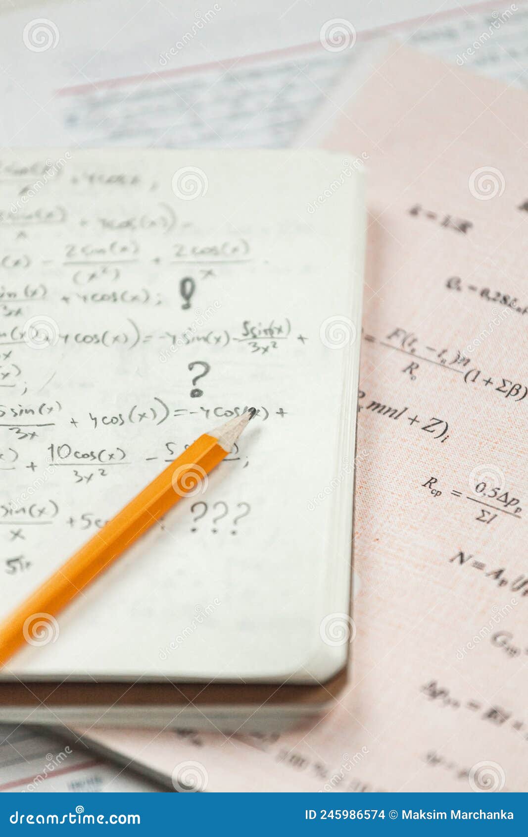 Math Formulas are Written in Pencil on a Piece of Paper, Math Problems ...