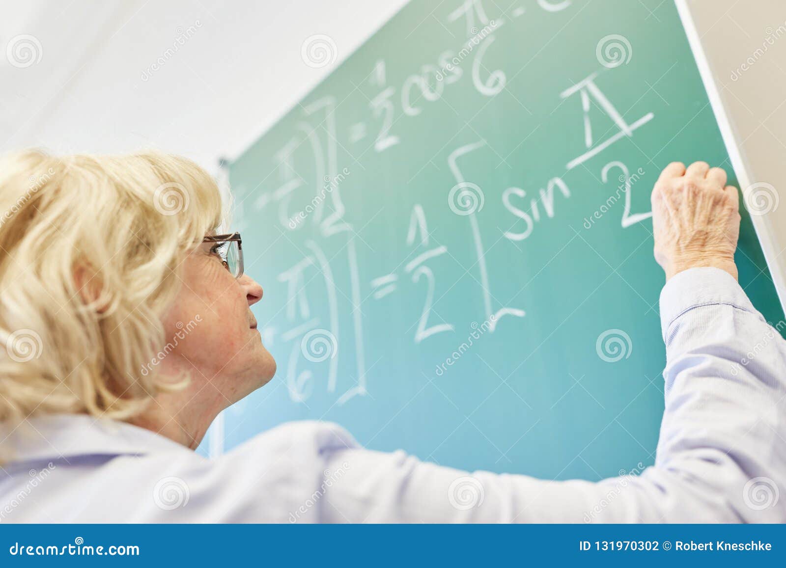 Math Lecturer Writes on Chalkboard Stock Photo - Image of computer ...