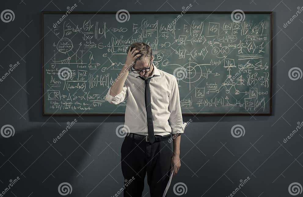 Math Student Standing in Front of the Chalkboard and Feeling Confused ...